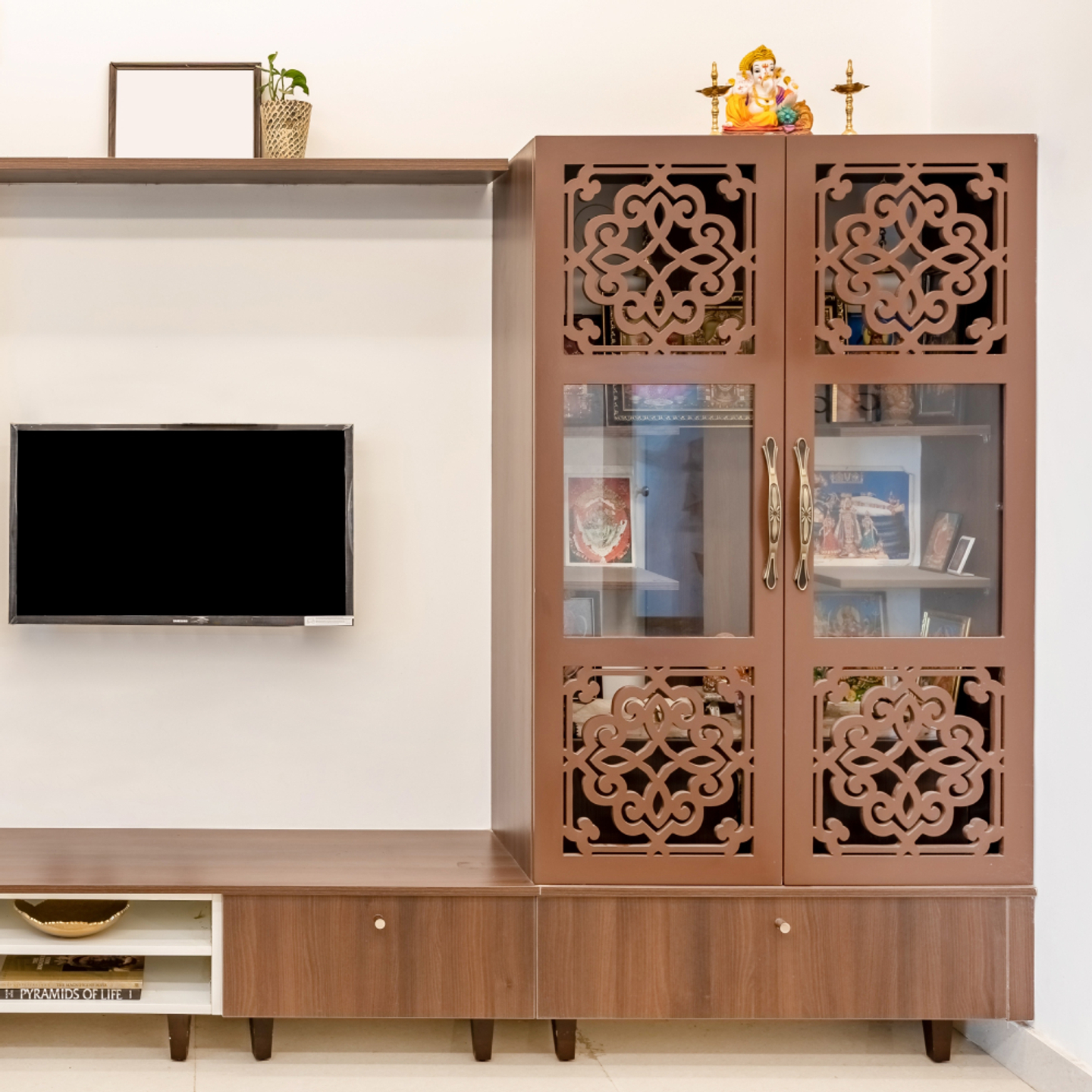 Compact Pooja Unit Design With Carved Pooja Room Doors | Livspace