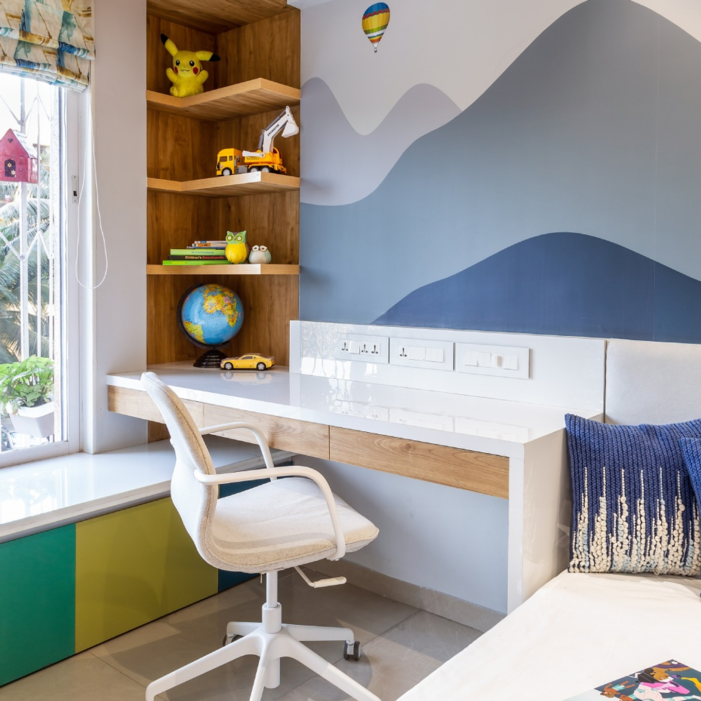 Kids' Bedroom Design With A Wall-Mounted Study Table | Livspace