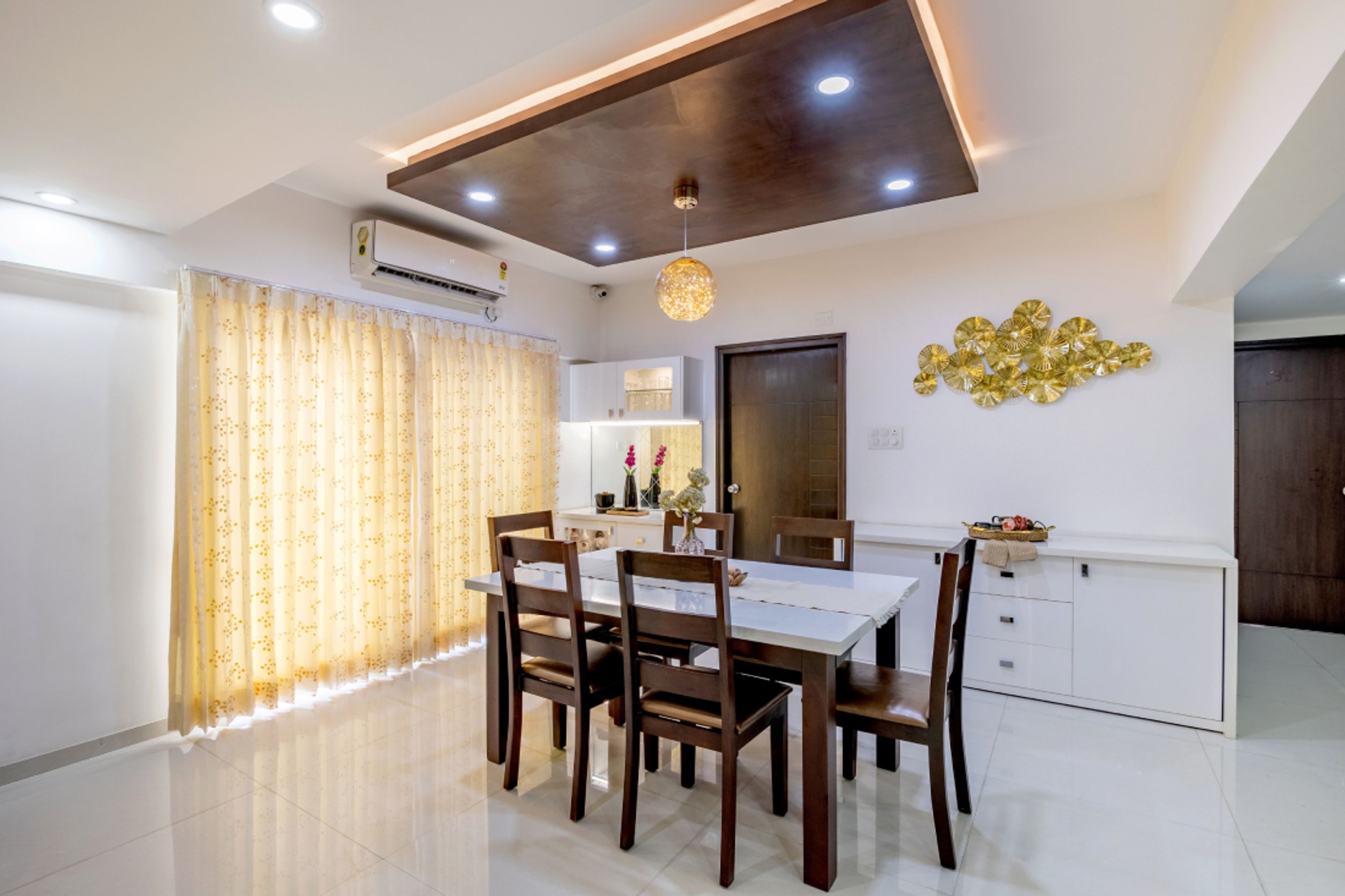 Chic Drop Down False Ceilings With Cove Lights | Livspace