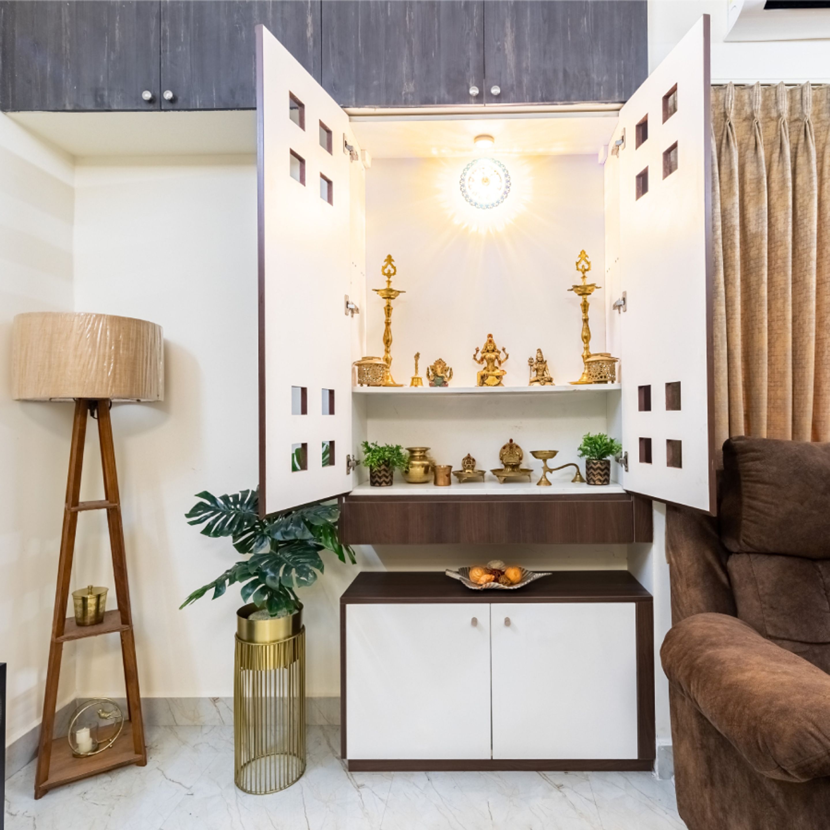 Compact Pooja Room Design With White Storage Unit | Livspace