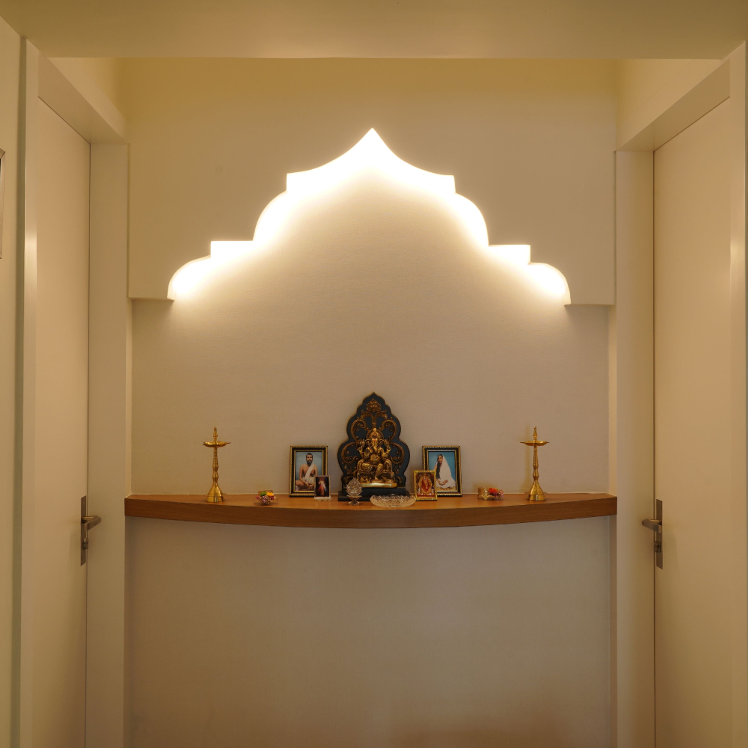 Spacious Pooja Unit With Wall Mounted Platform | Livspace