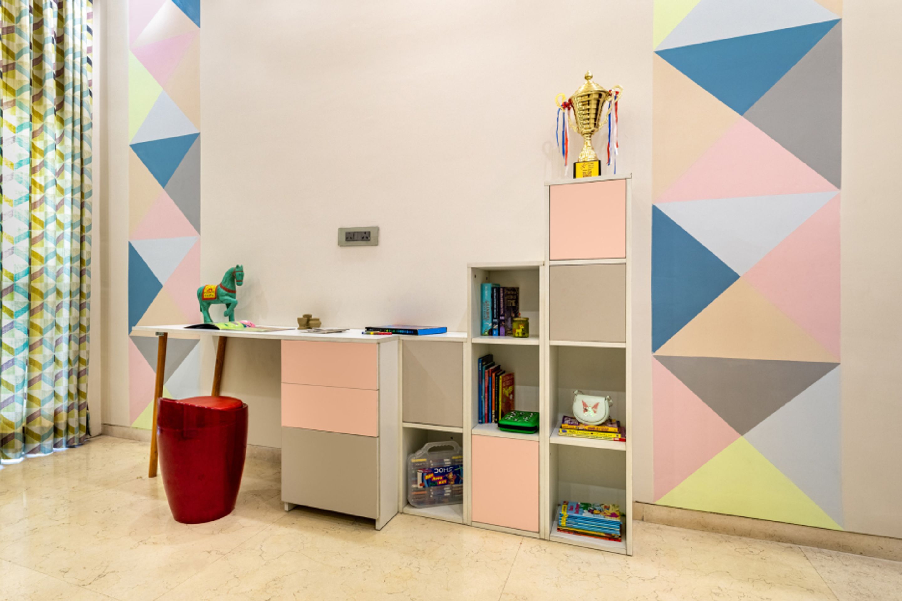 Multicolour Wall Paint Design With A Light Pink Base | Livspace