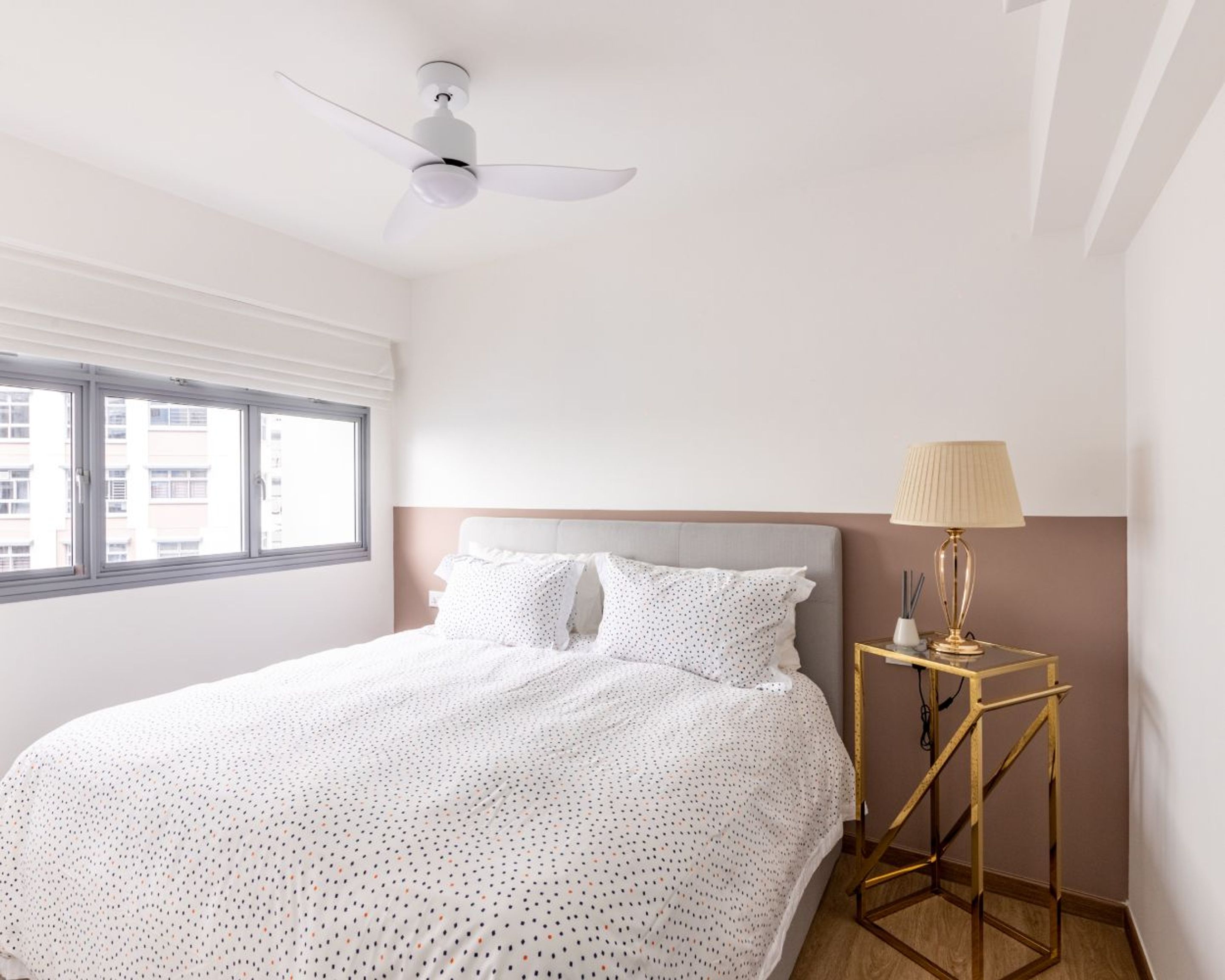 Compact Master Bedroom Design With Brown-White Wall And Grey Bed | Livspace