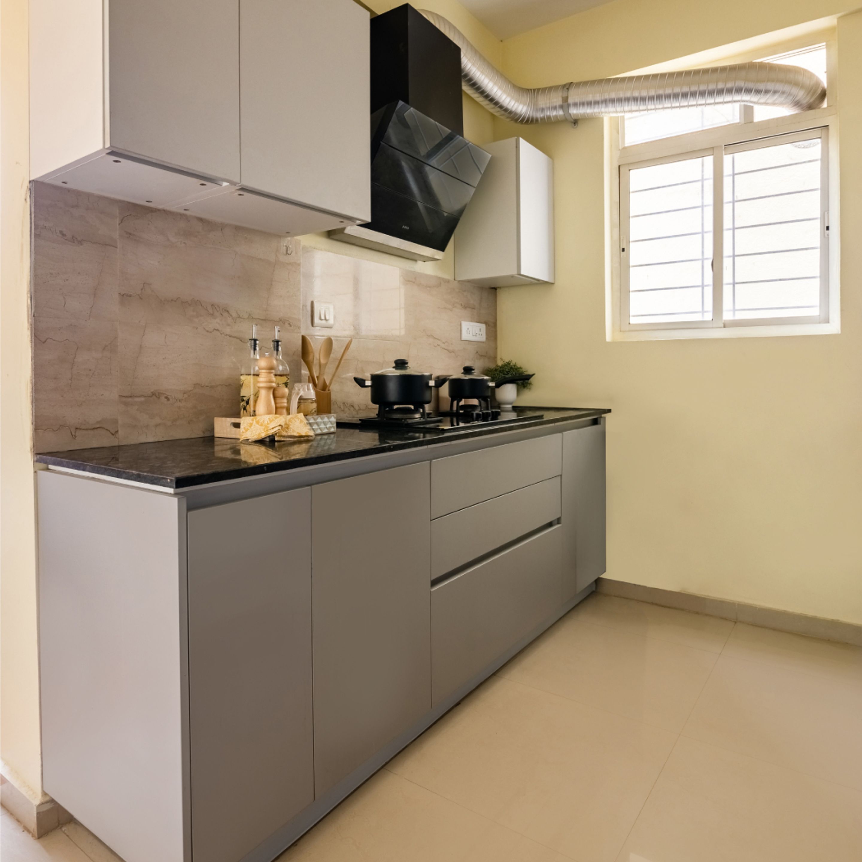 Square-Shaped Wall Tiles Design With A Glossy Finish | Livspace