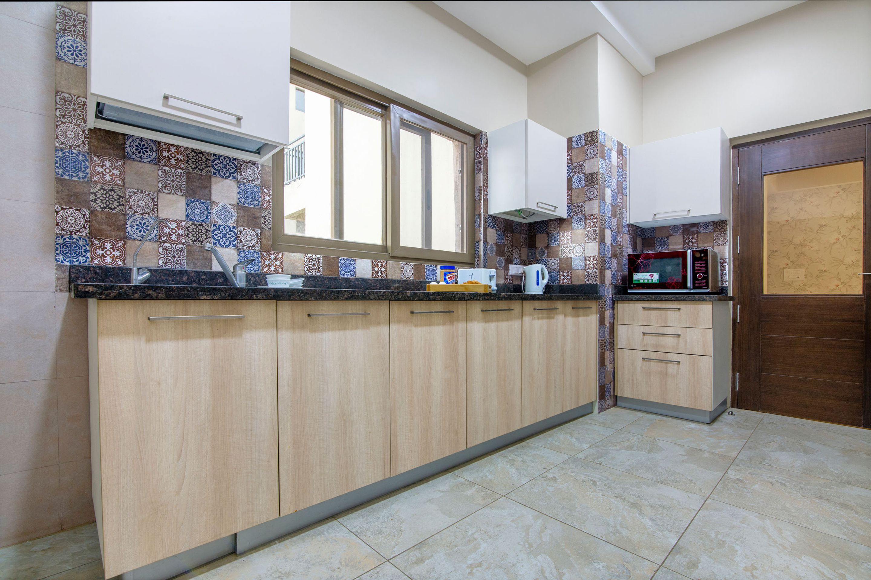 Wood And White Mid-Century Modern Parallel Kitchen Design With Moroccan ...