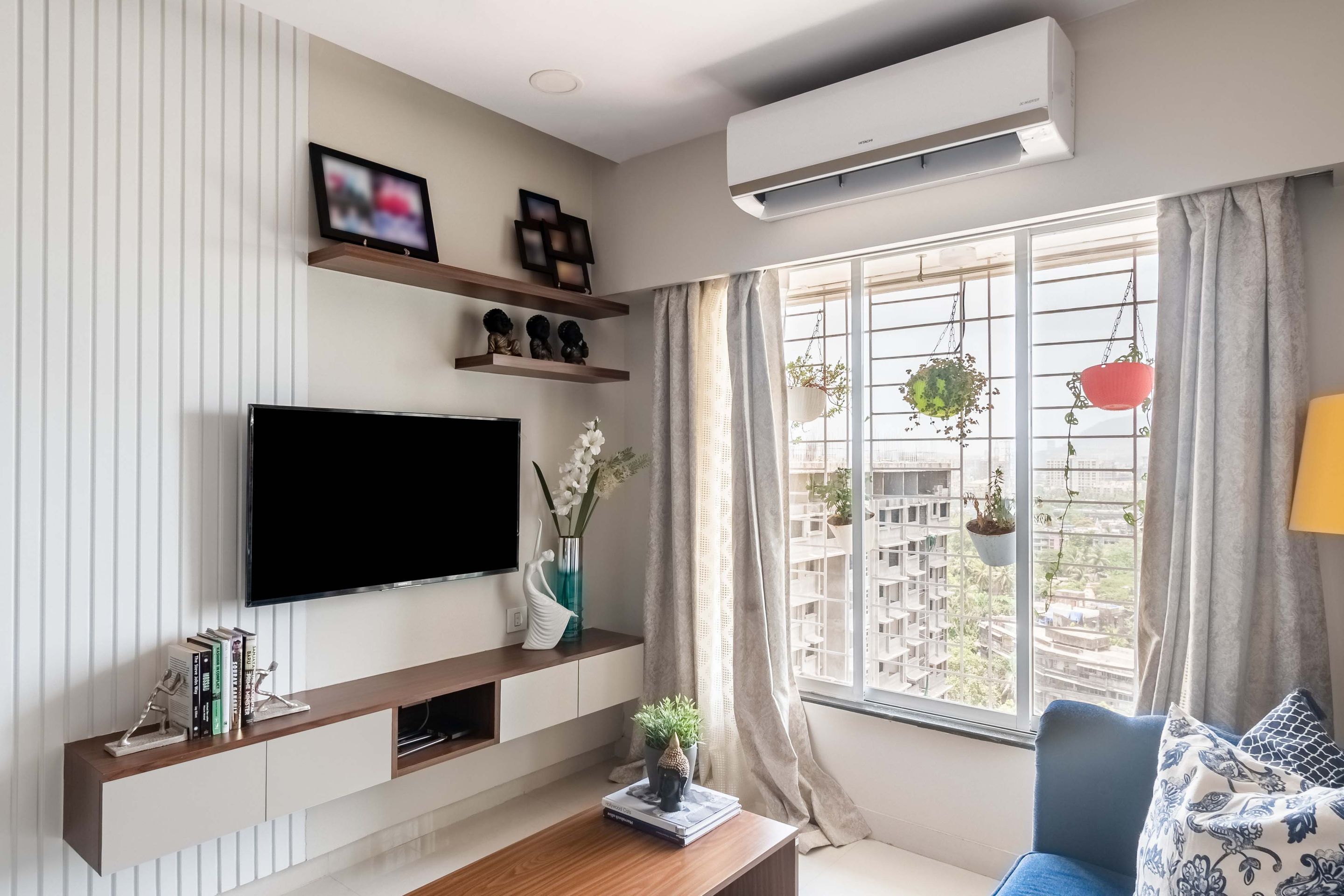 Beige And Brown TV Unit Design With White Panel | Livspace