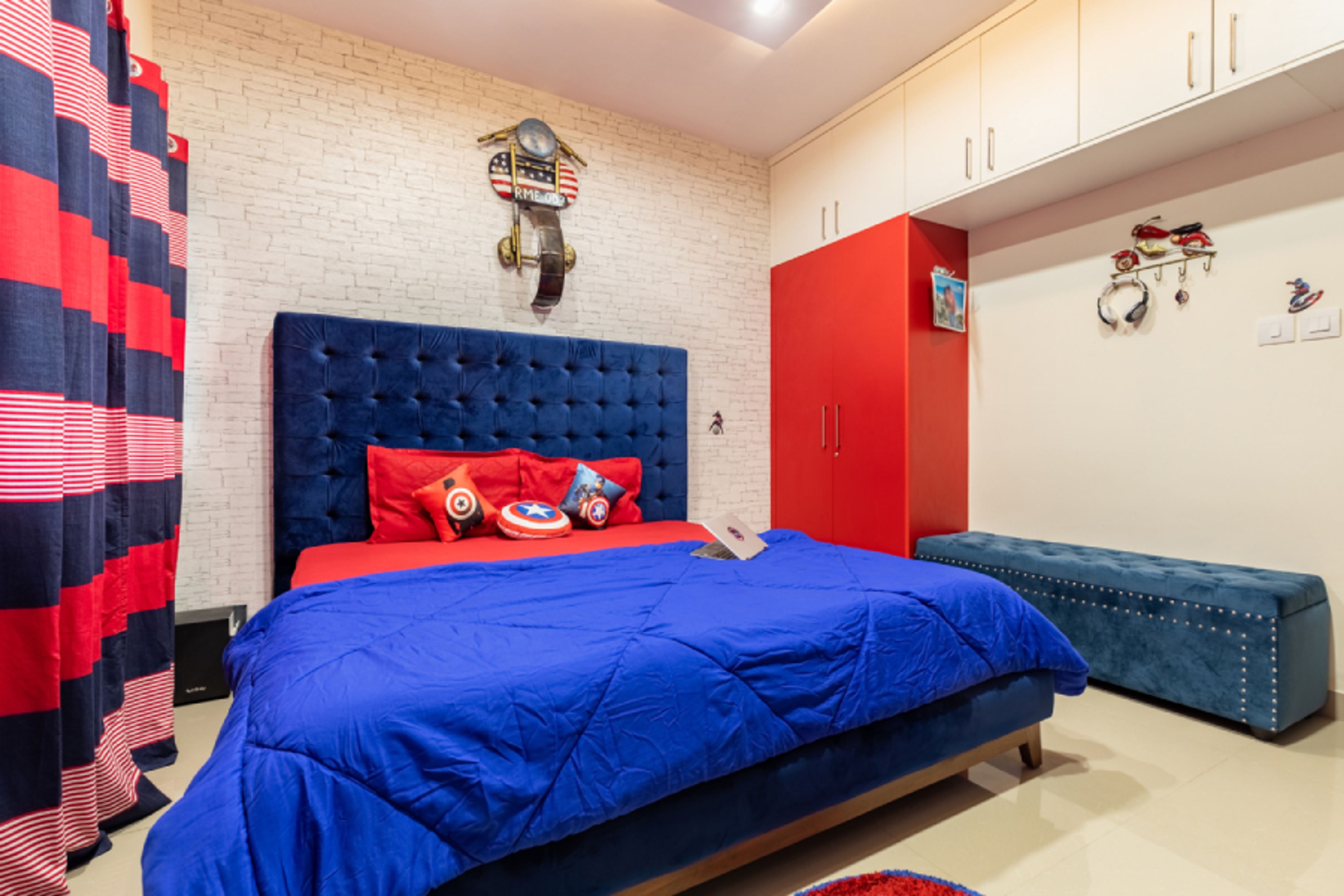Spacious Kids Room Design With Blue And Red Interiors - 12x10 Ft | Livspace