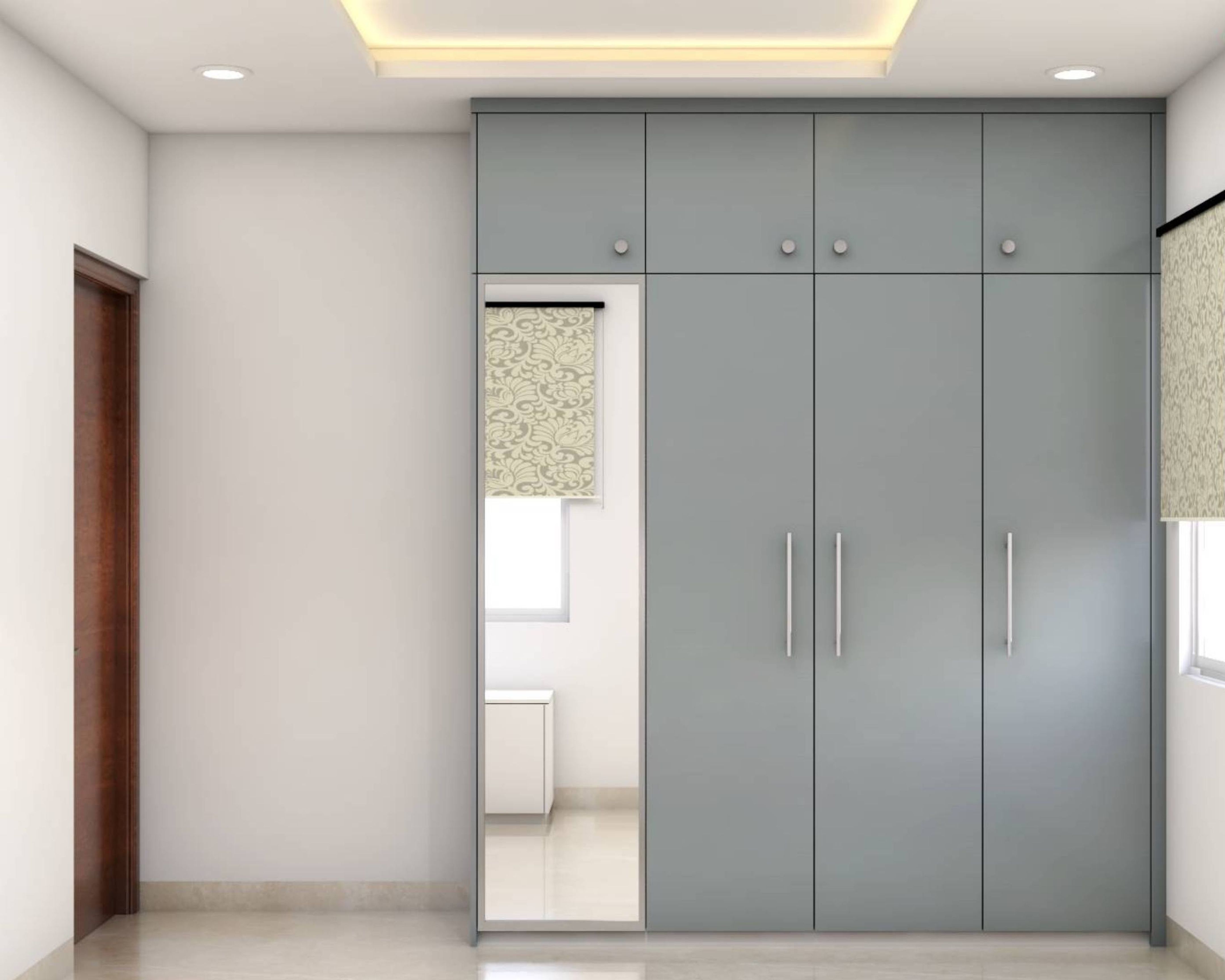 Modern Grey Themed Compact Wardrobe Design With Mirror | Livspace Modern Grey Themed Compact Wardrobe Design With Mirror | Livspace