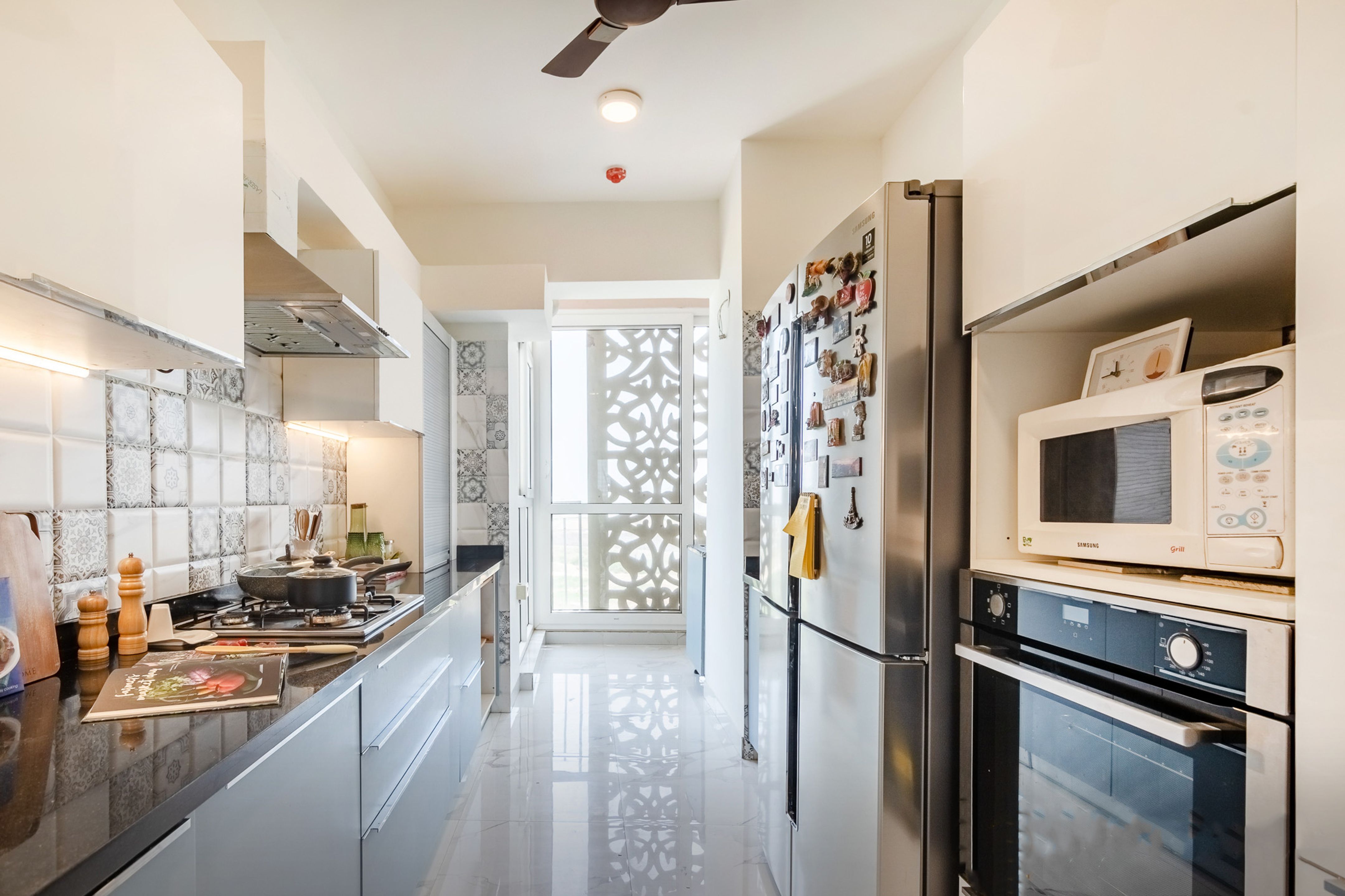 Modern Parallel Kitchen Design with Smokey Grey and Champagne Cabinets ...