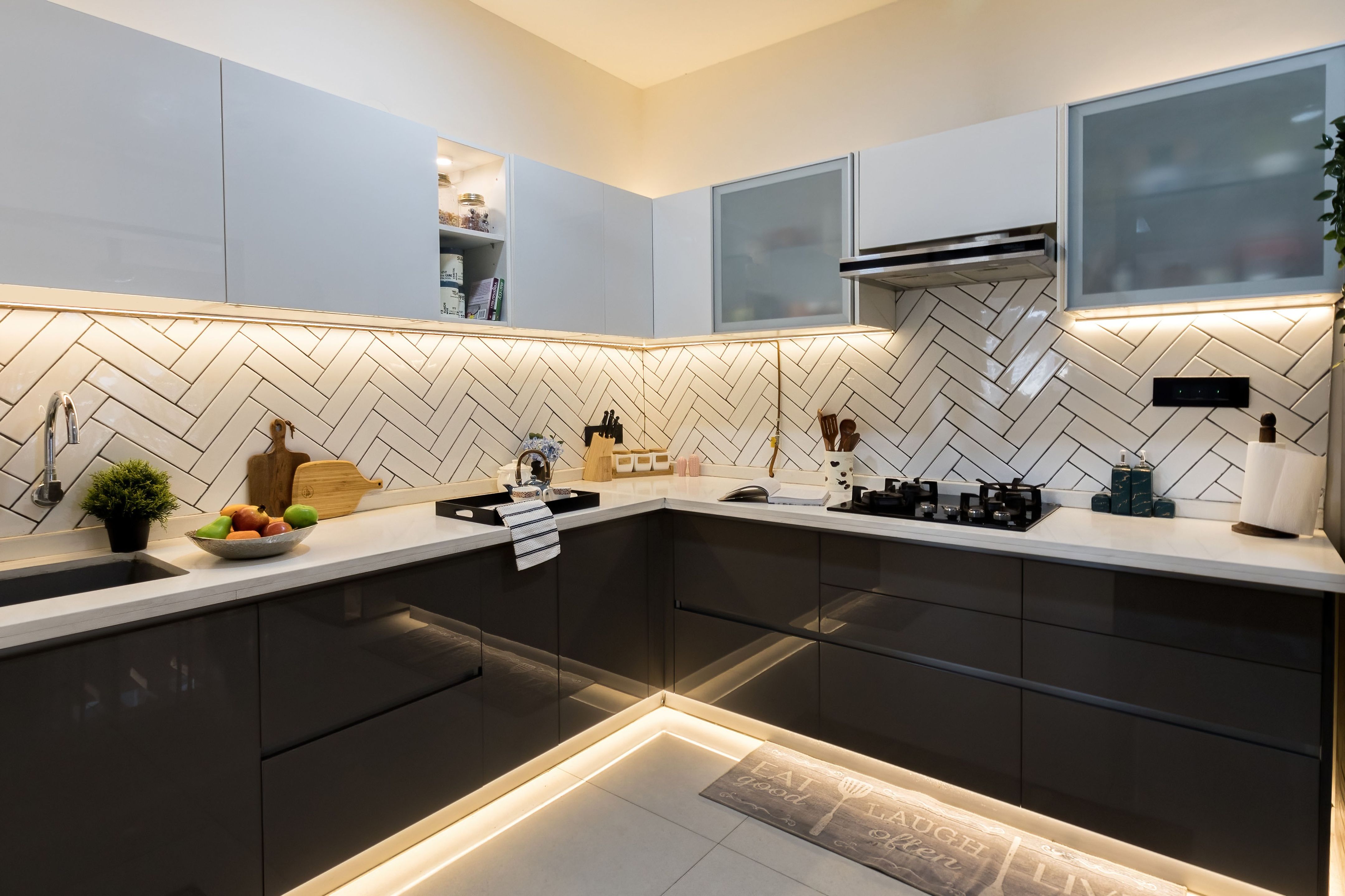 White Ceramic Herringbone Kitchen Tile Design | Livspace