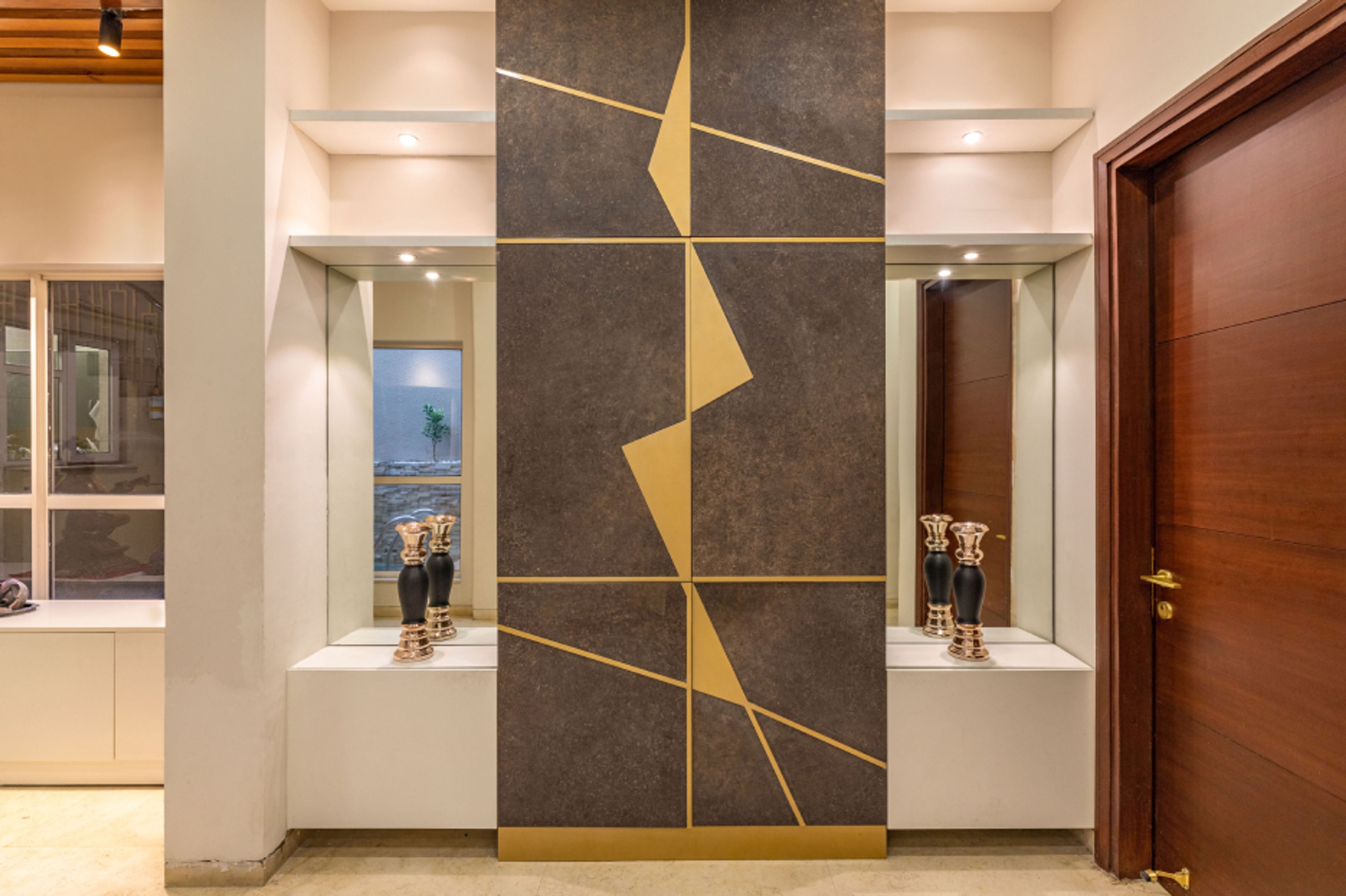 Spacious Foyer Design With Wall Panels | Livspace