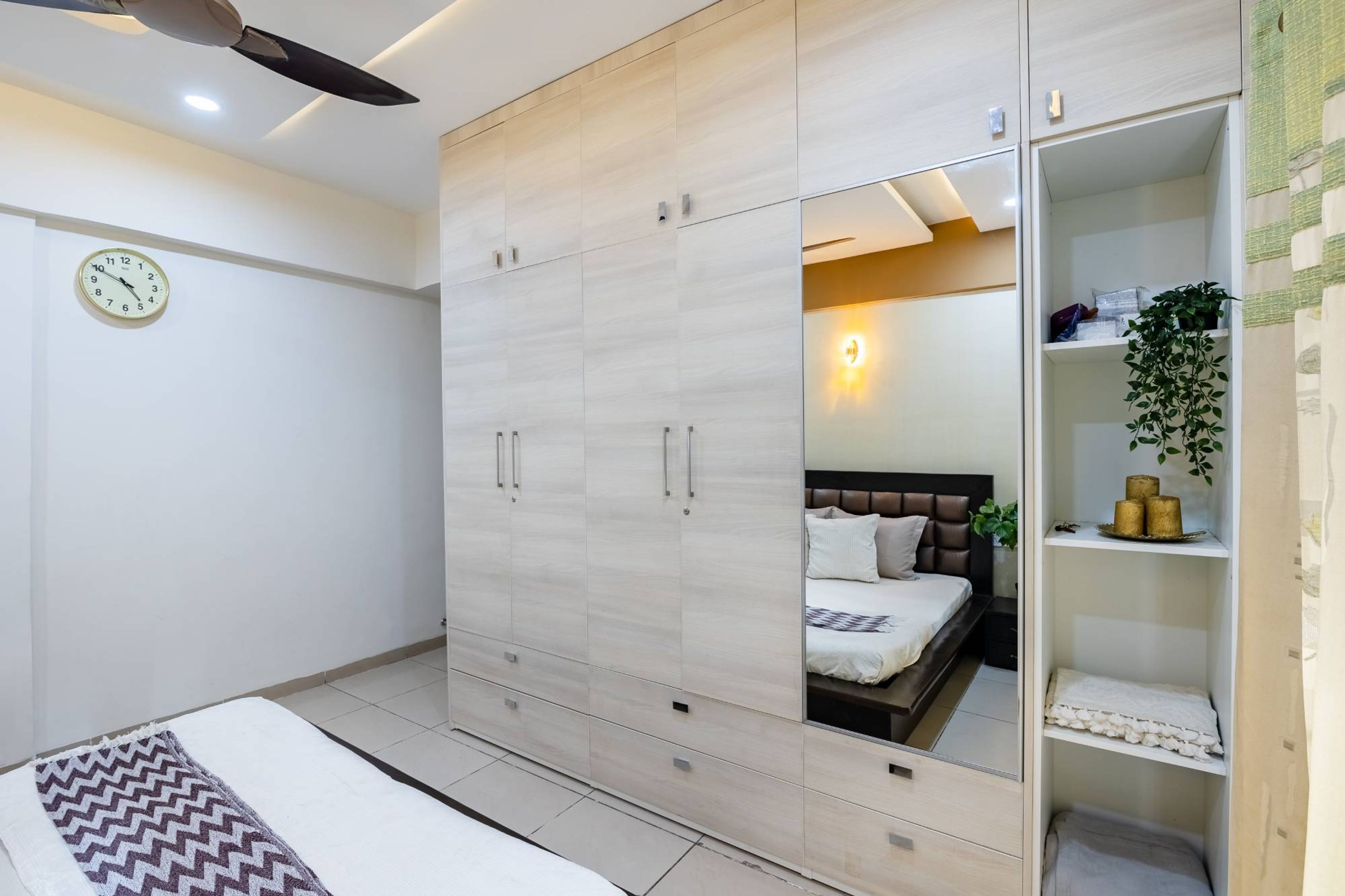 Compact Guest Room Design With Multilayered False Ceiling | Livspace