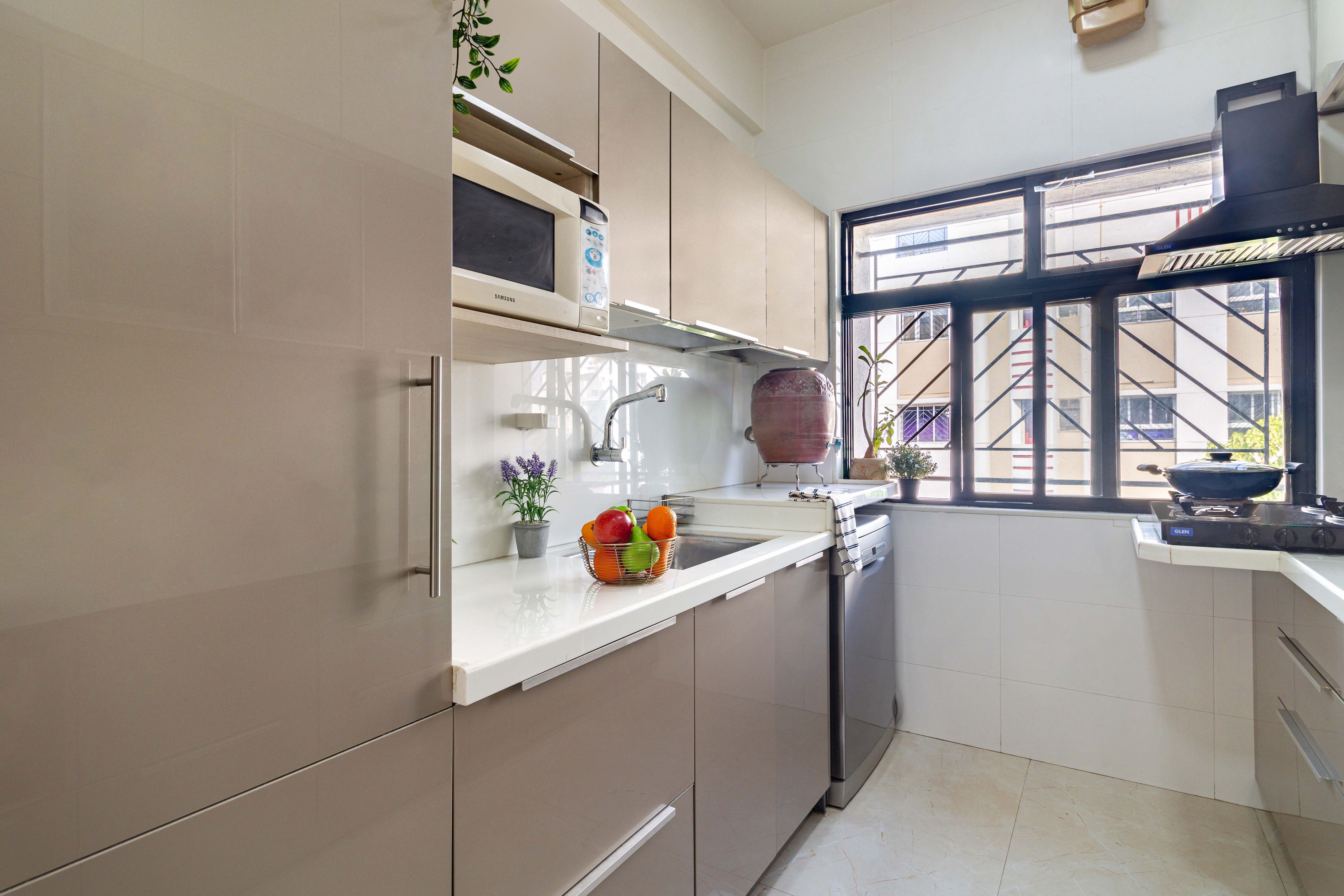 Modular Parallel Kitchen Design With Quartz Countertop | Livspace