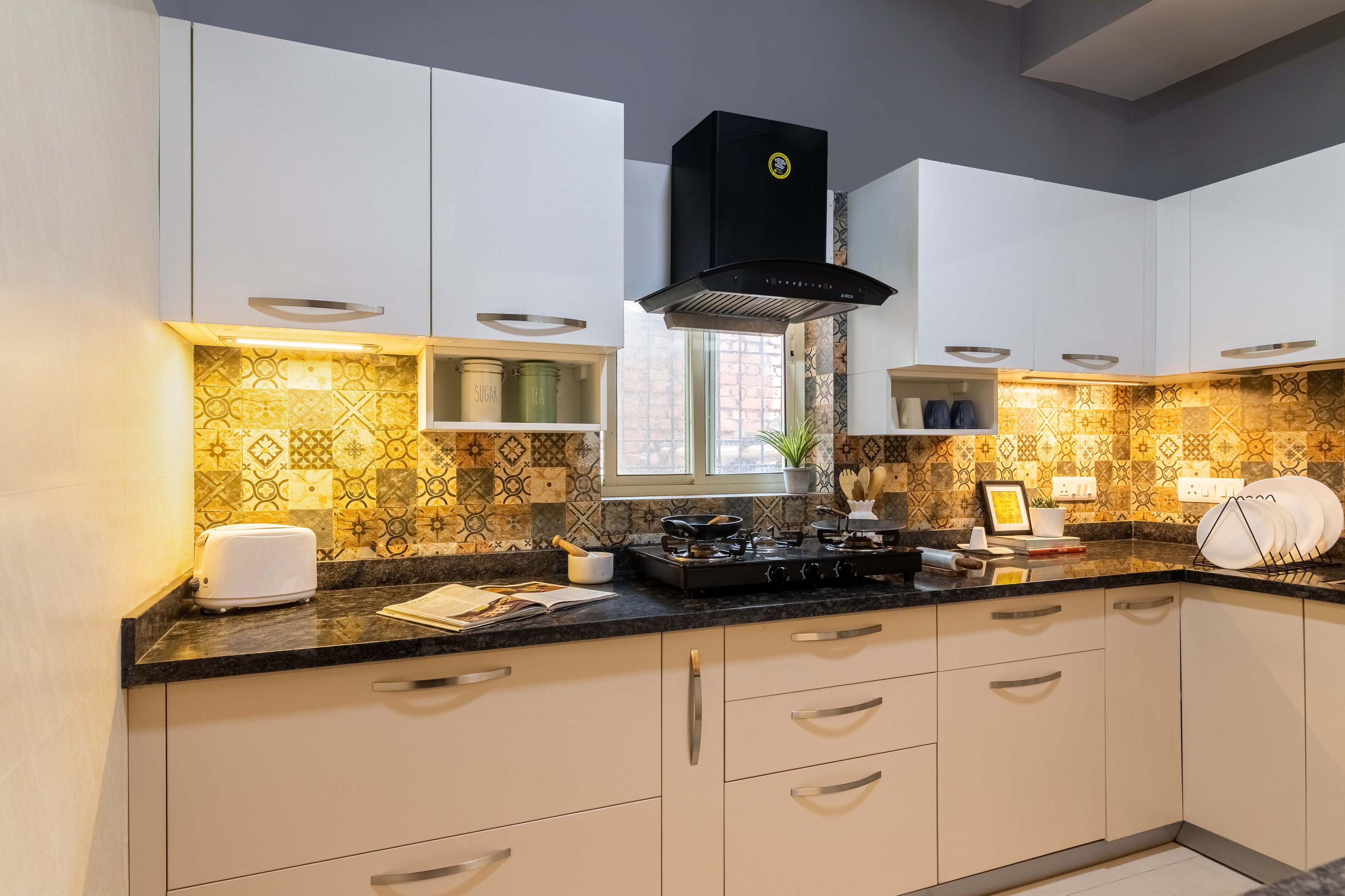 Spacious L-Shaped Modular Kitchen Design With Champagne And White-Toned Cabinets - 12x6 Ft ...