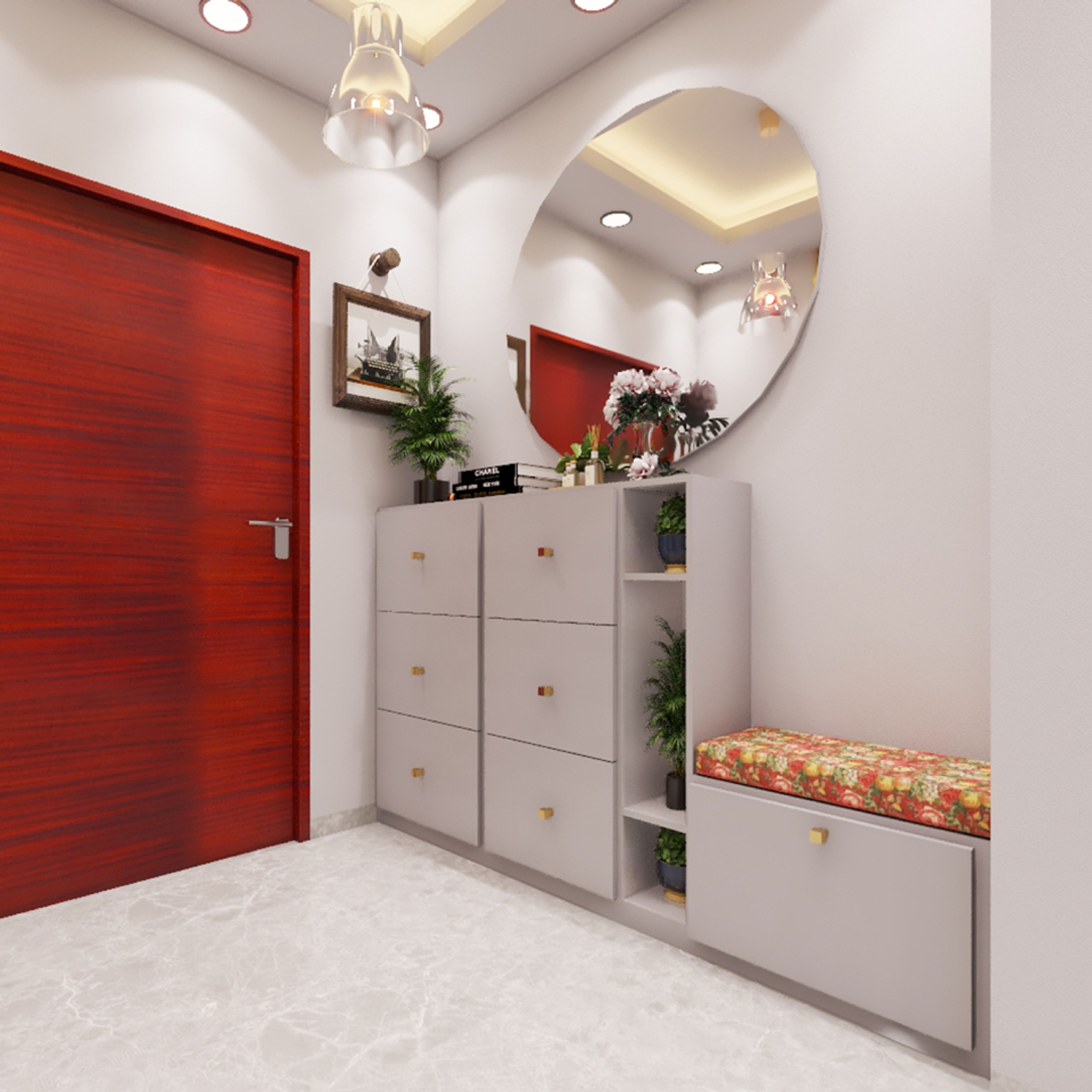 Spacious Foyer Design With Colourful Cushioned Seating | Livspace