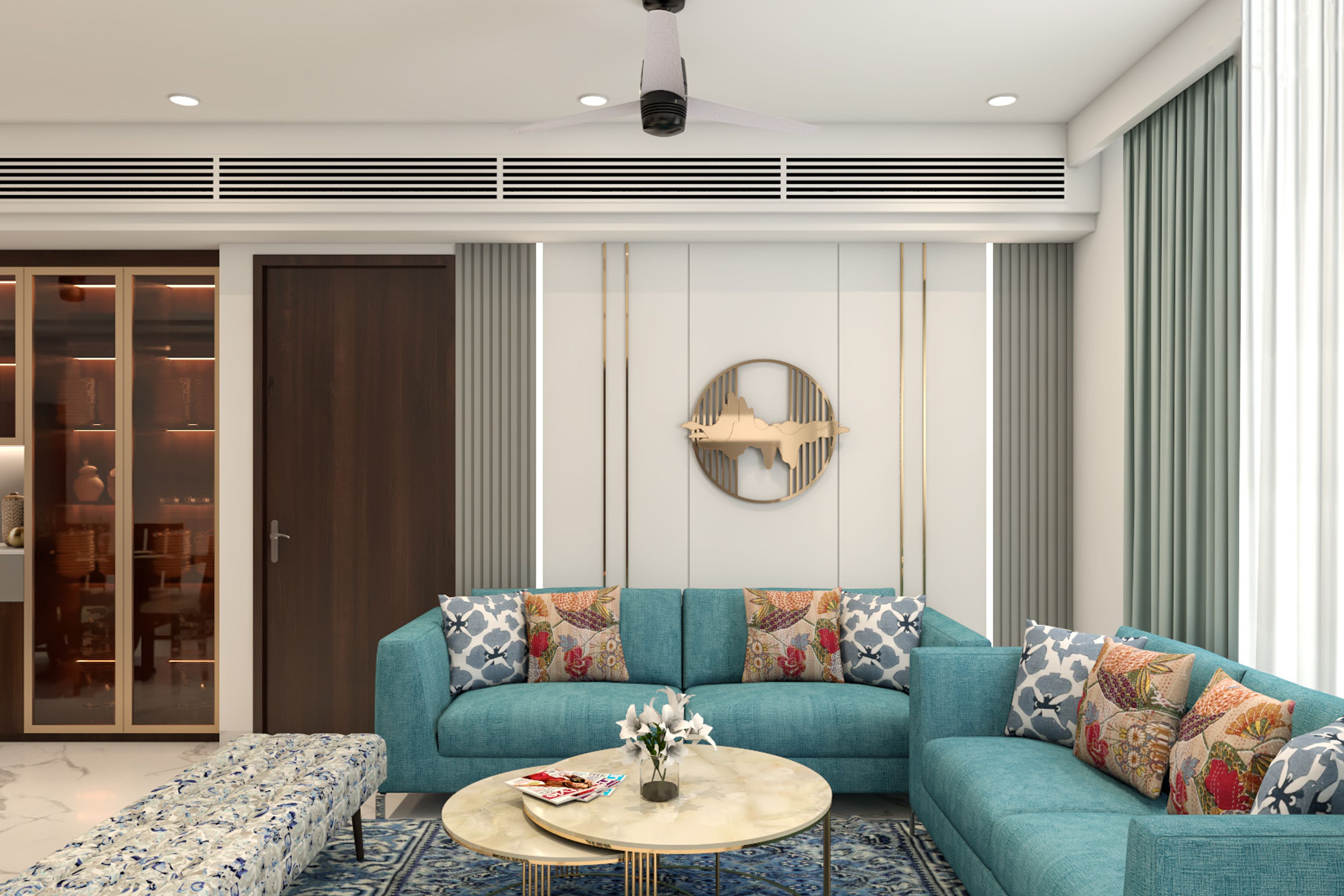 Living Room Design With L-Shaped Blue Sofa And Printed Cushions | Livspace