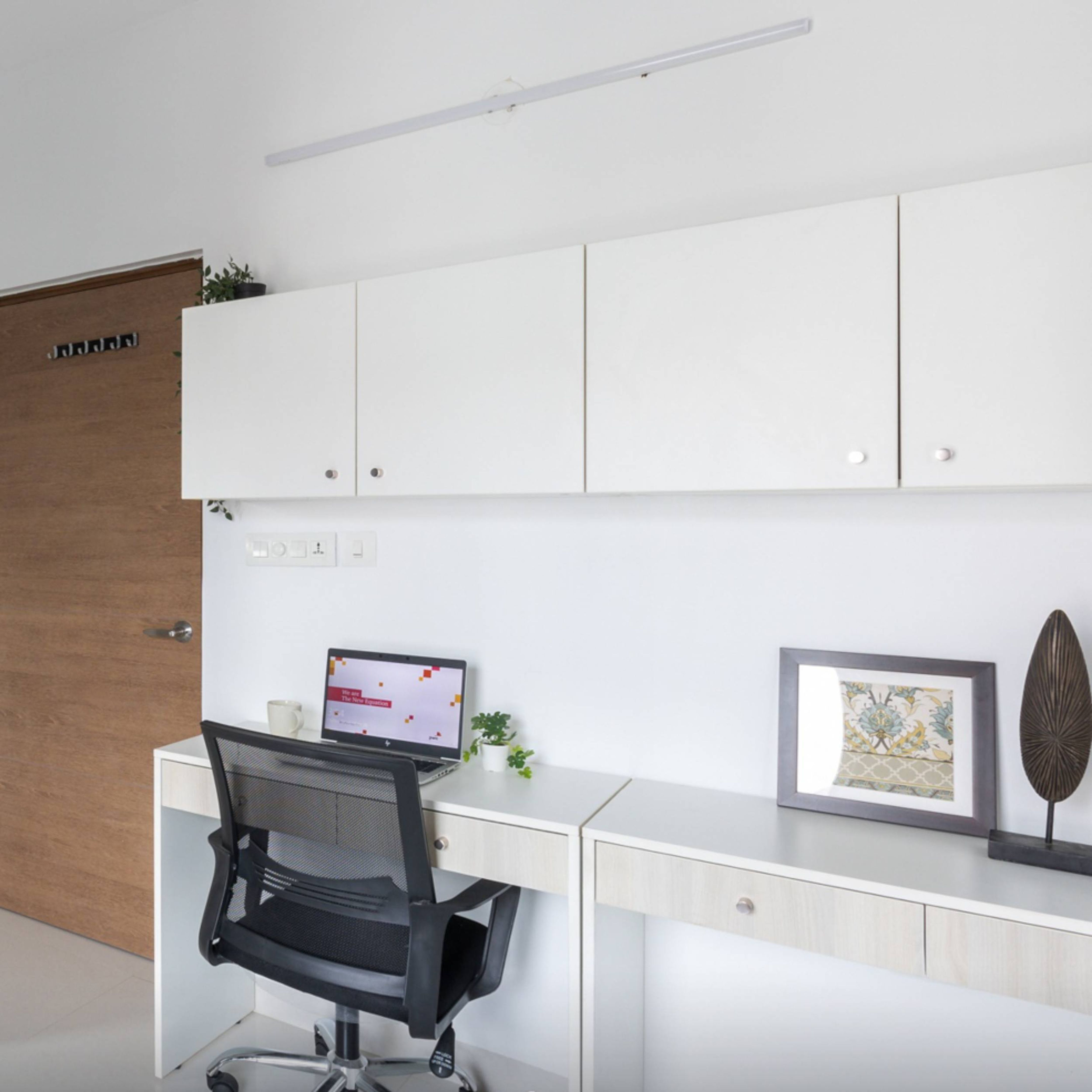 Compact Study Room Design With Frosty White And Pine Table | Livspace