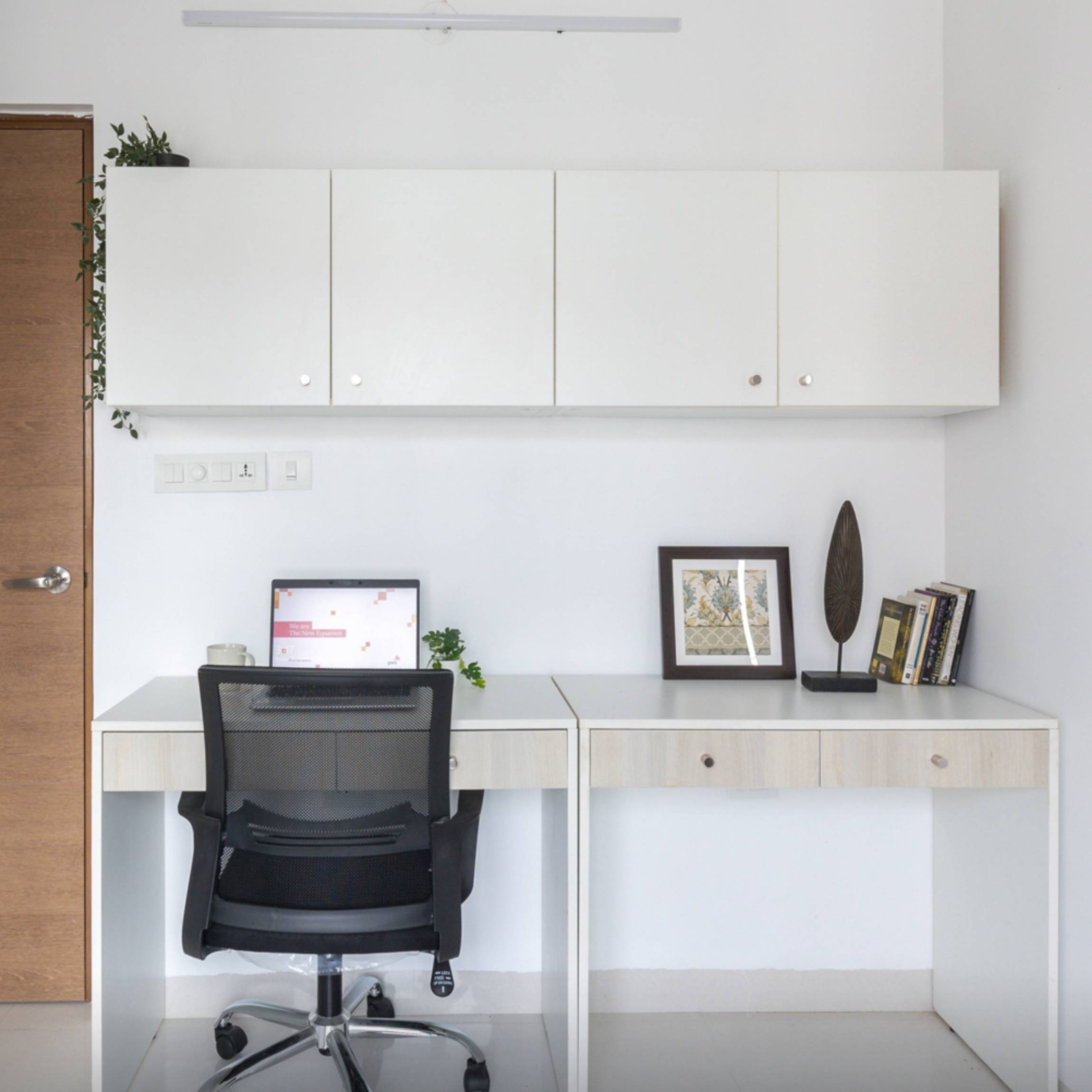 Compact Study Room Design With Frosty White And Pine Table | Livspace
