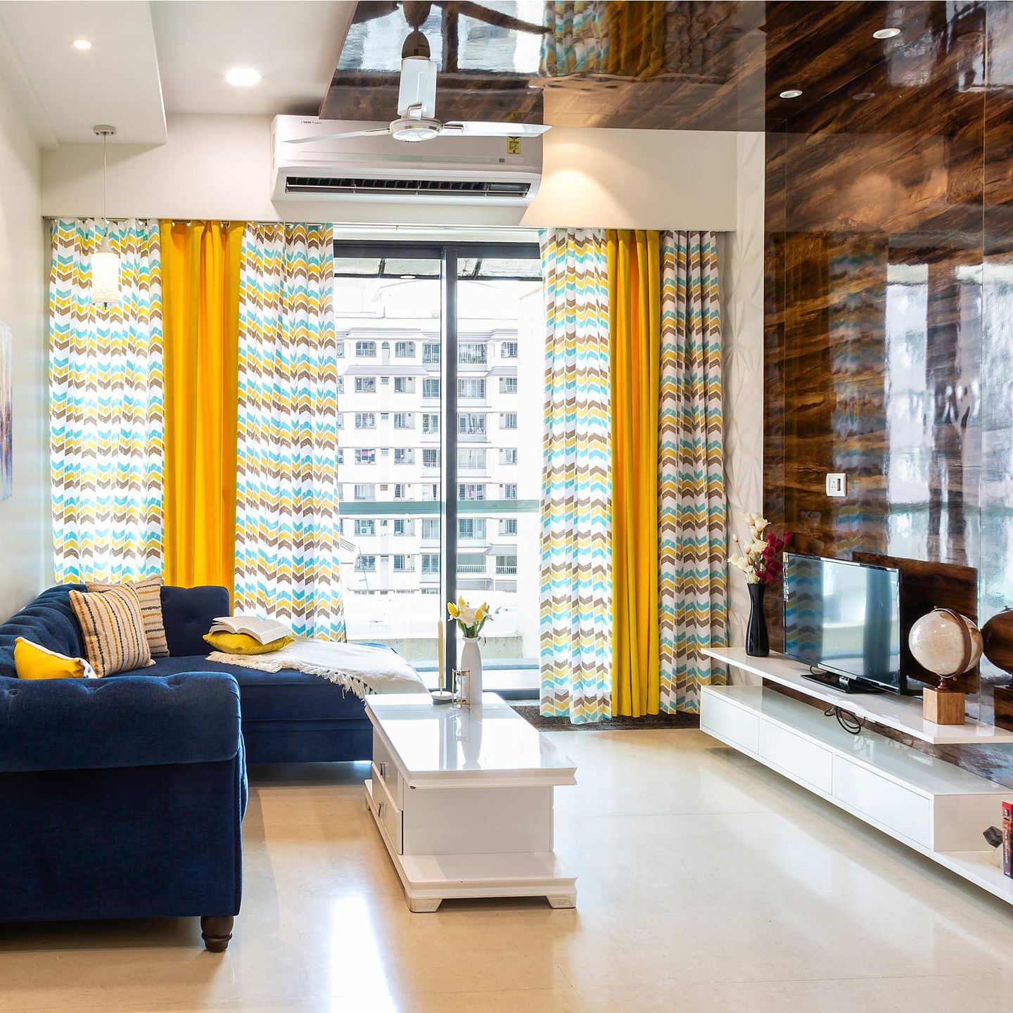 Living Room Tile Design With Bianco Beige Marble Tiles | Livspace