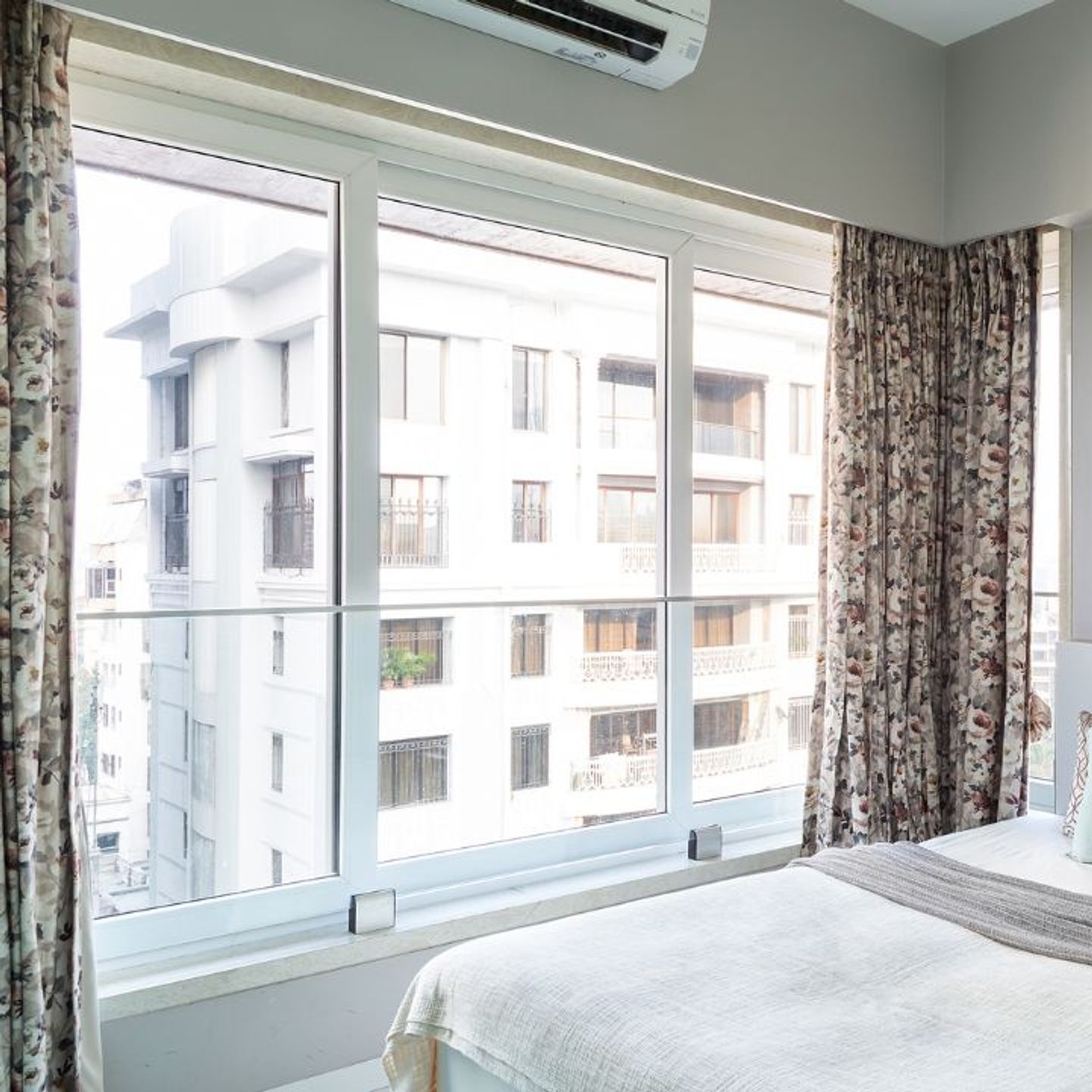 Full-Length Window Design With Floral Curtains | Livspace