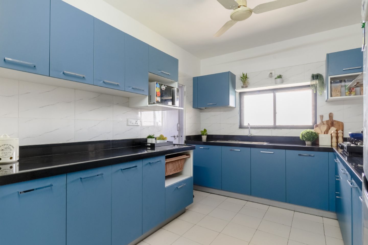 Kitchen Window Design With Sliding Glass Shutters | Livspace
