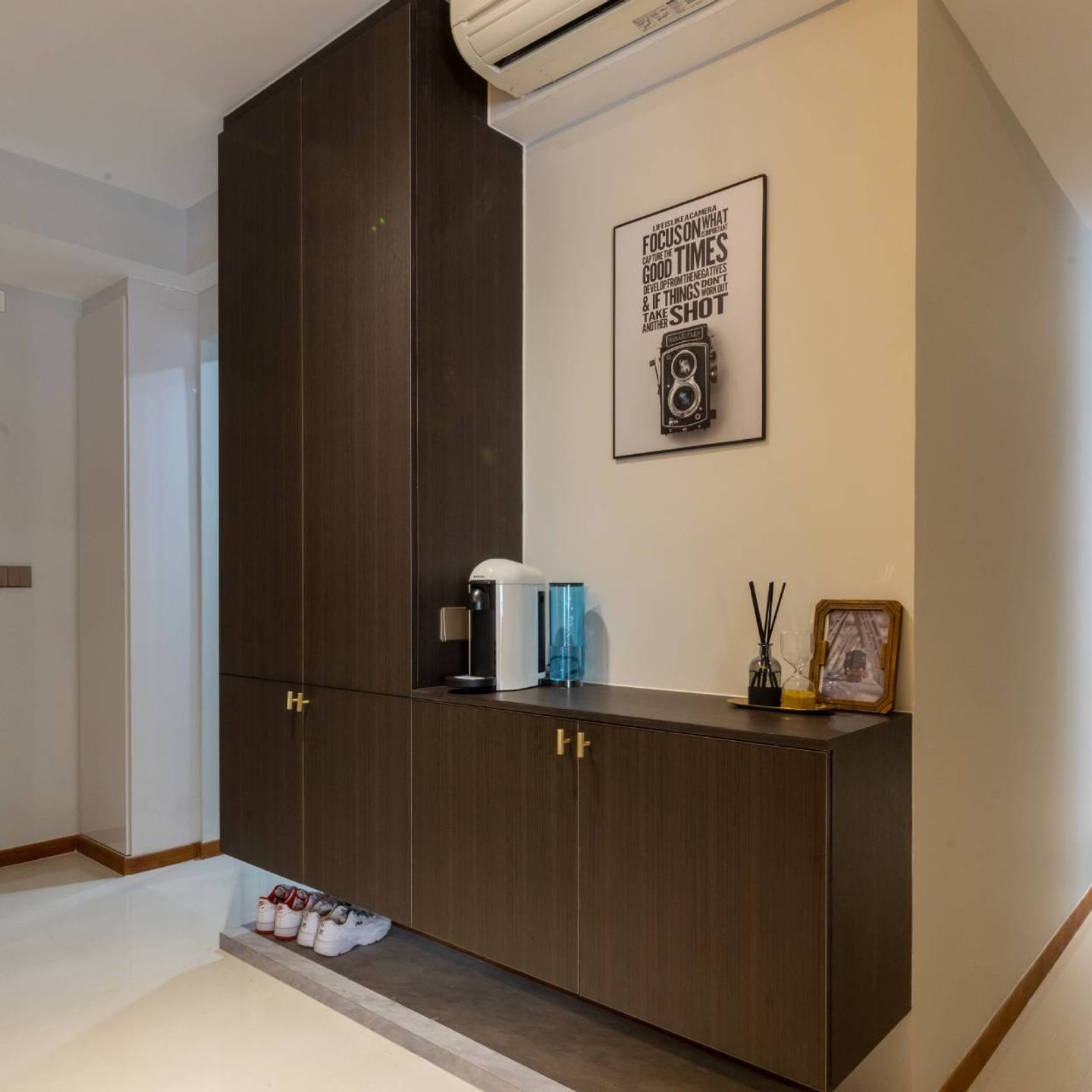 Dark Brown Mid-Century Modern Foyer Design With Spacious Storage Unit ...