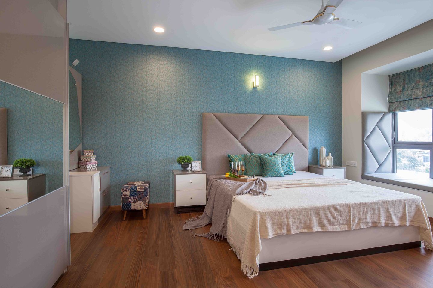 Modern Master Bedroom Design with Beige Panelled Headboard | Livspace