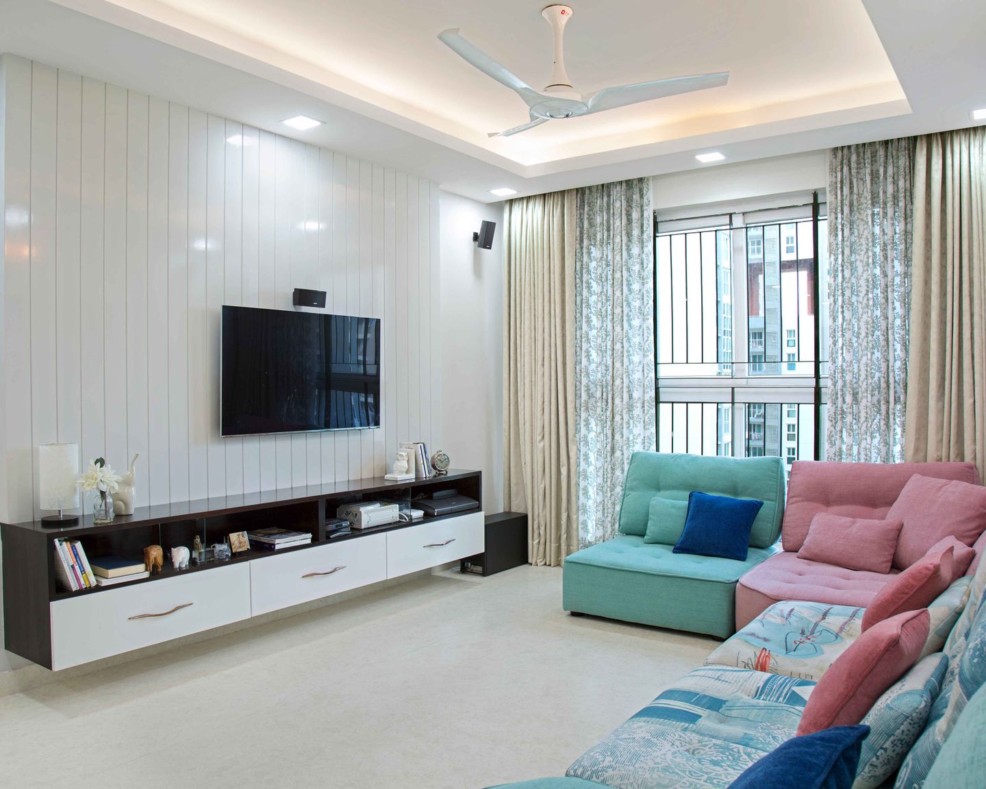 White And Wood TV Unit Design With Closed And Open Storage | Livspace