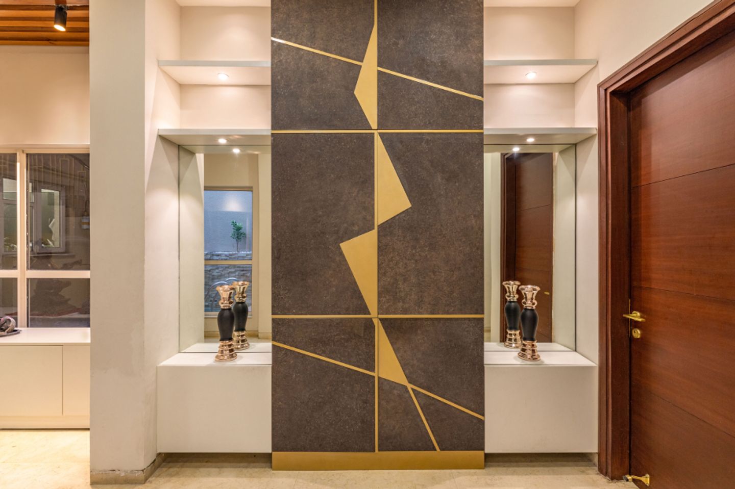 Spacious Foyer Design With Wall Panels | Livspace