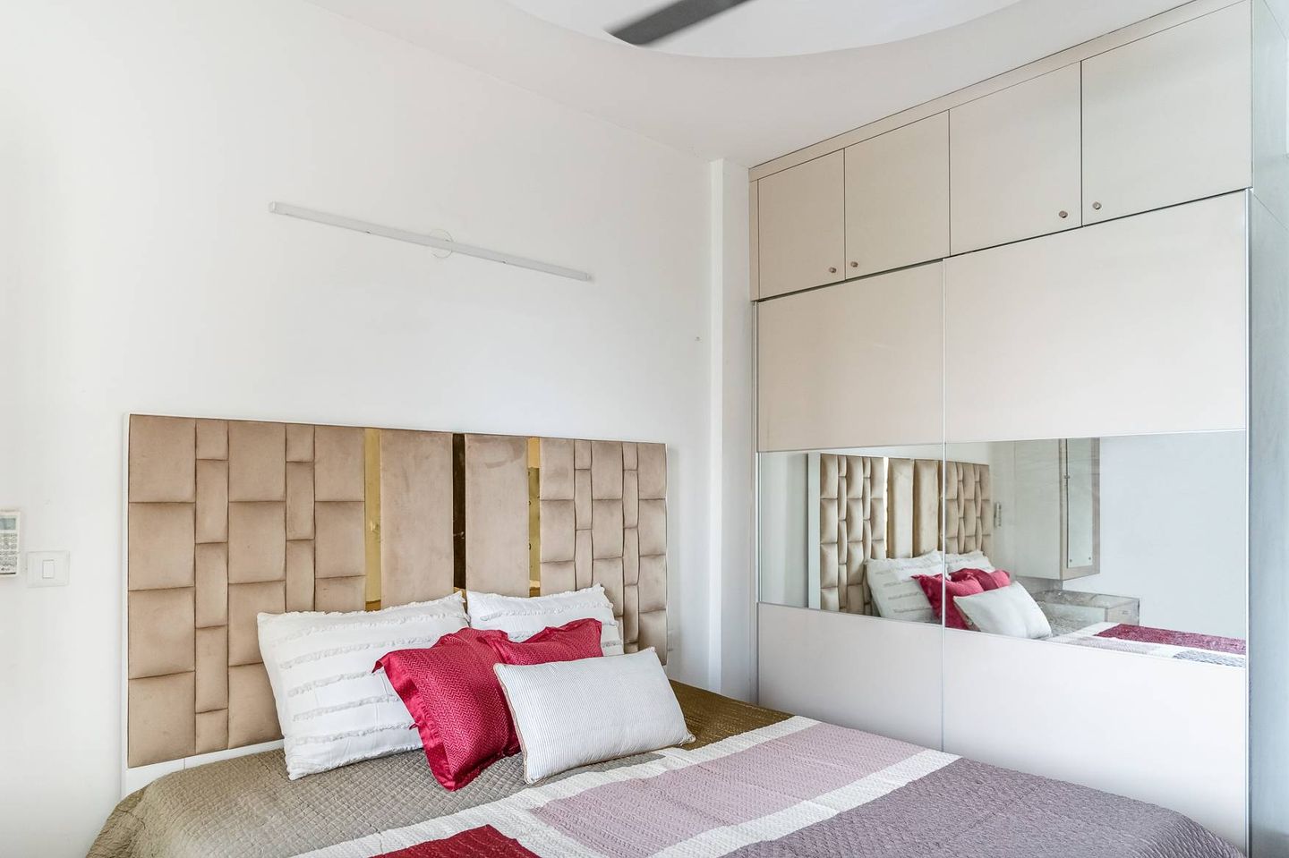 Spacious Guest Room Design With Velvet Headboard | Livspace