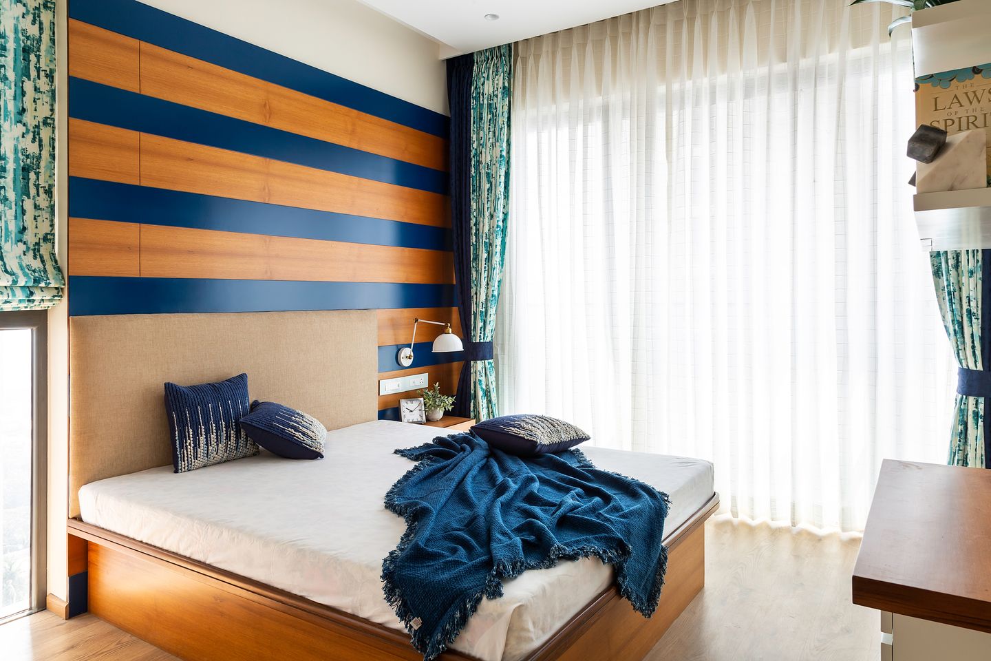 Spacious Guest Bedroom Design With Blue And Wallnut Wall Features ...