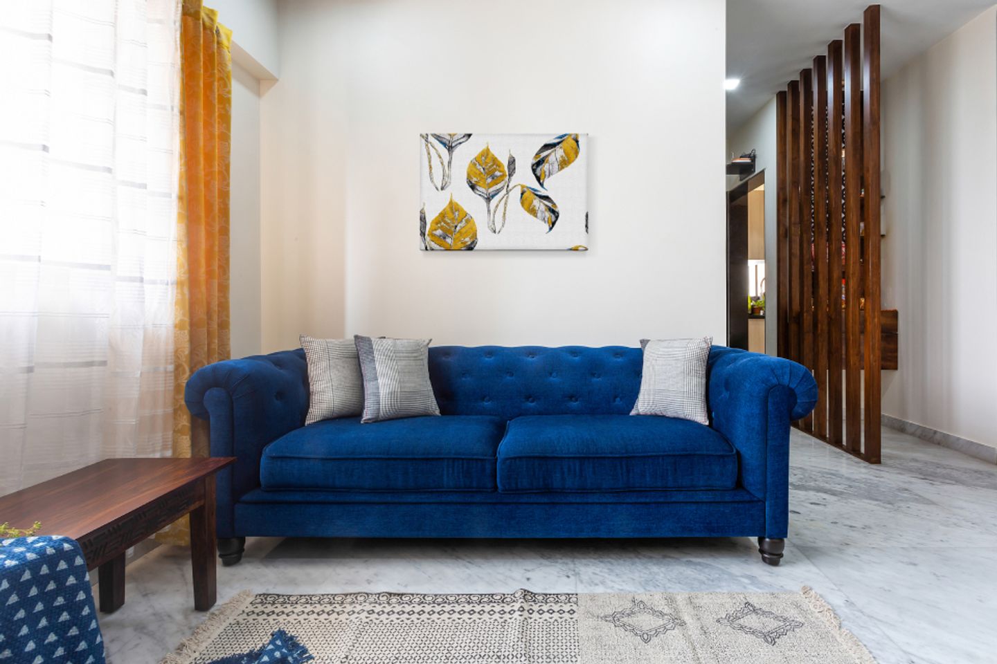 Compact Drawing Room Design With Wooden Centre Table | Livspace