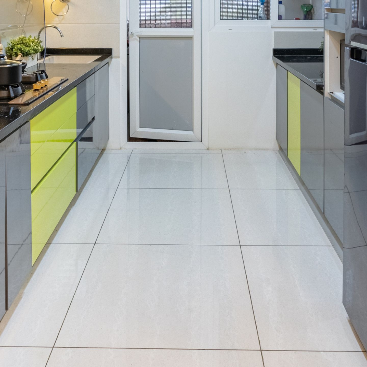 Glossy Wall Tiles Design For Kitchen Walls | Livspace