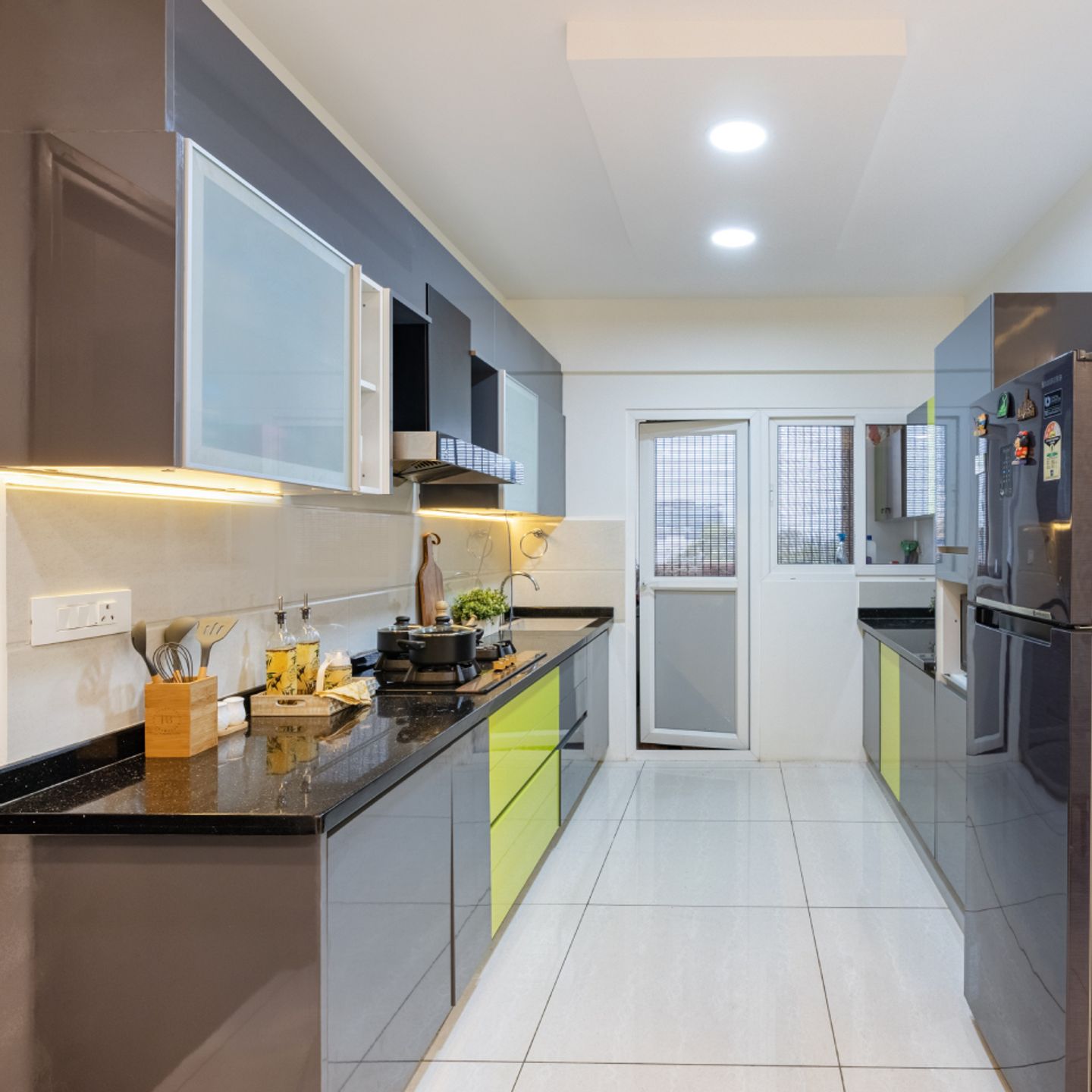 Glossy Wall Tiles Design For Kitchen Walls | Livspace