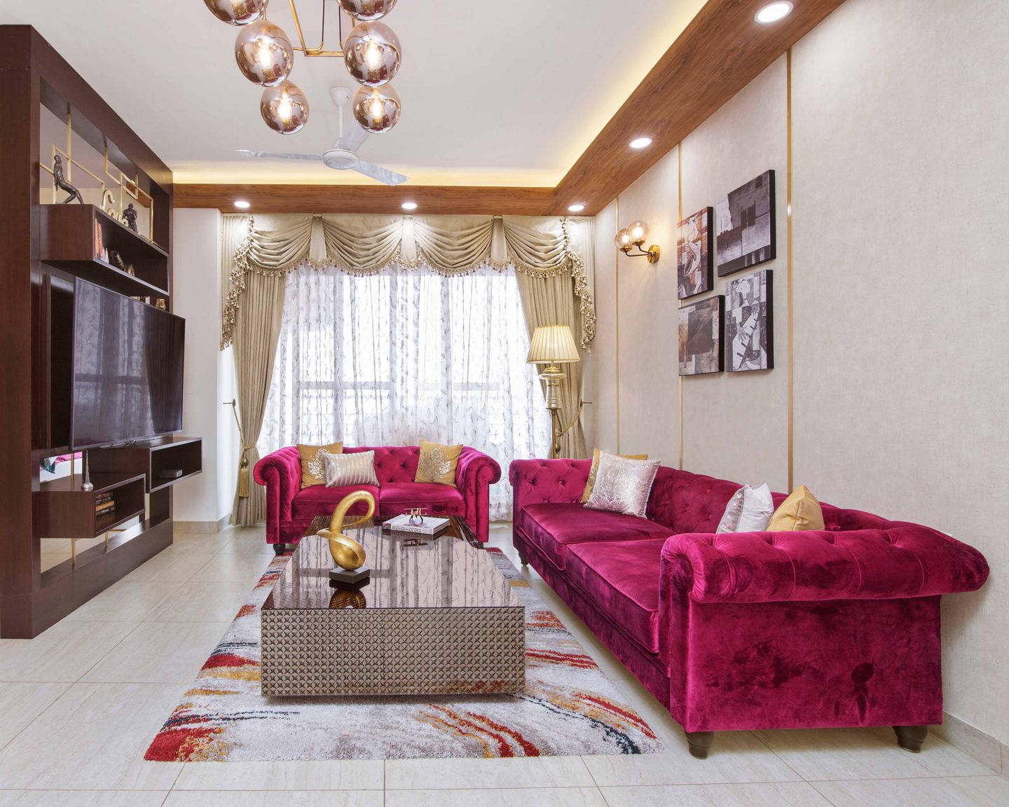 L-Shaped Wooden Ceiling Design For Living Room With Chandelier | Livspace