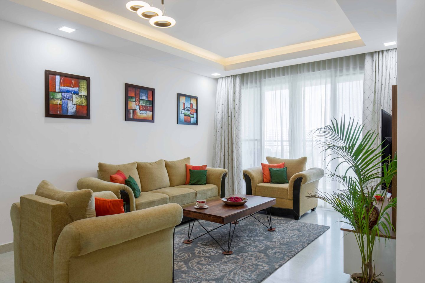 U-Shaped Contemporary Living Room Design With Brown Sofa Unit | Livspace