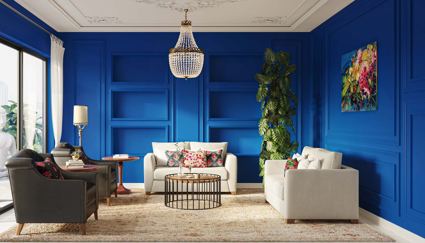 Living Room Blue Wall Design With Boxed Panels And Wall Trims | Livspace
