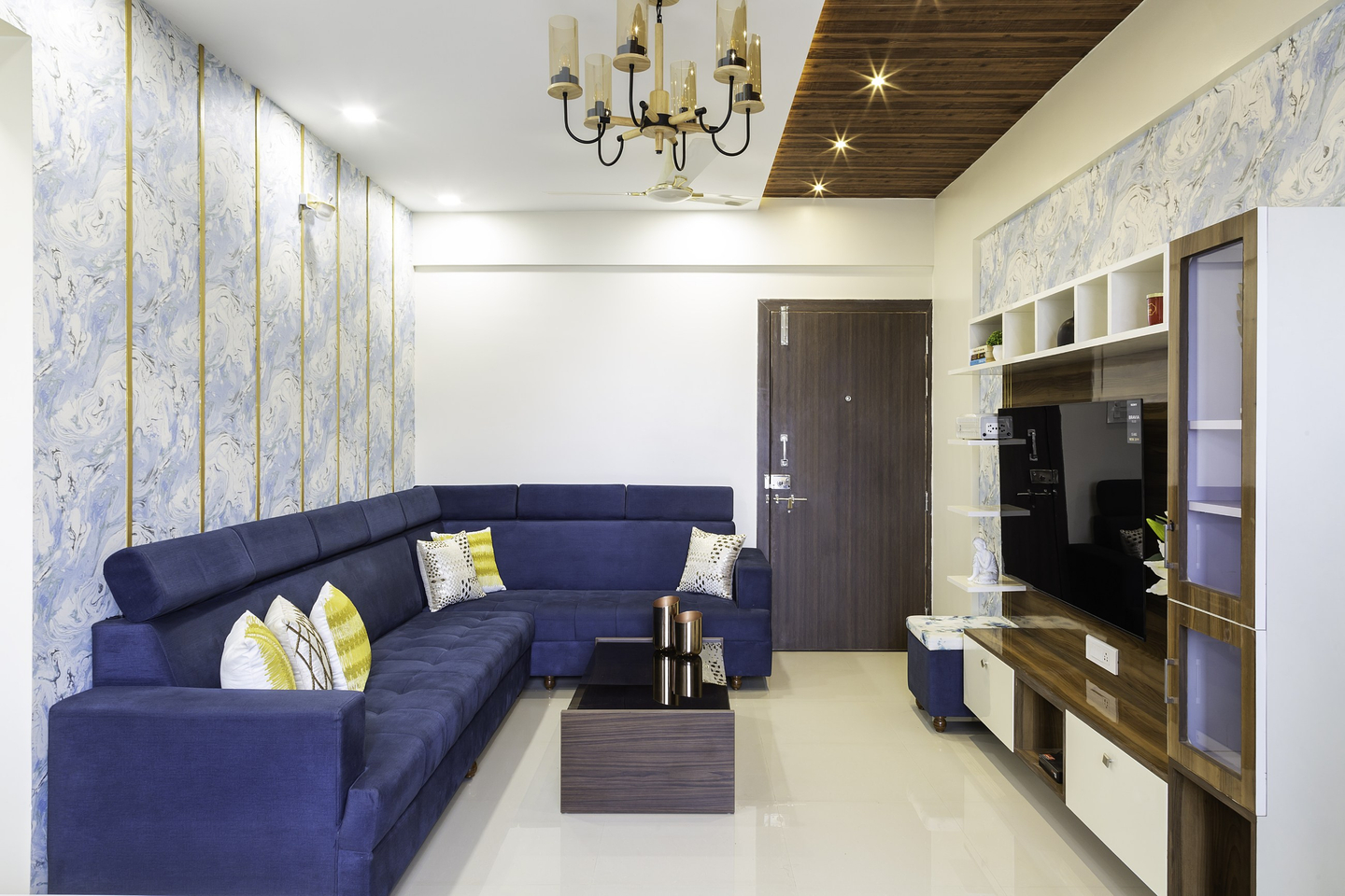 Central Drop False Ceiling Design With Dark Wooden Rafter And Cove ...