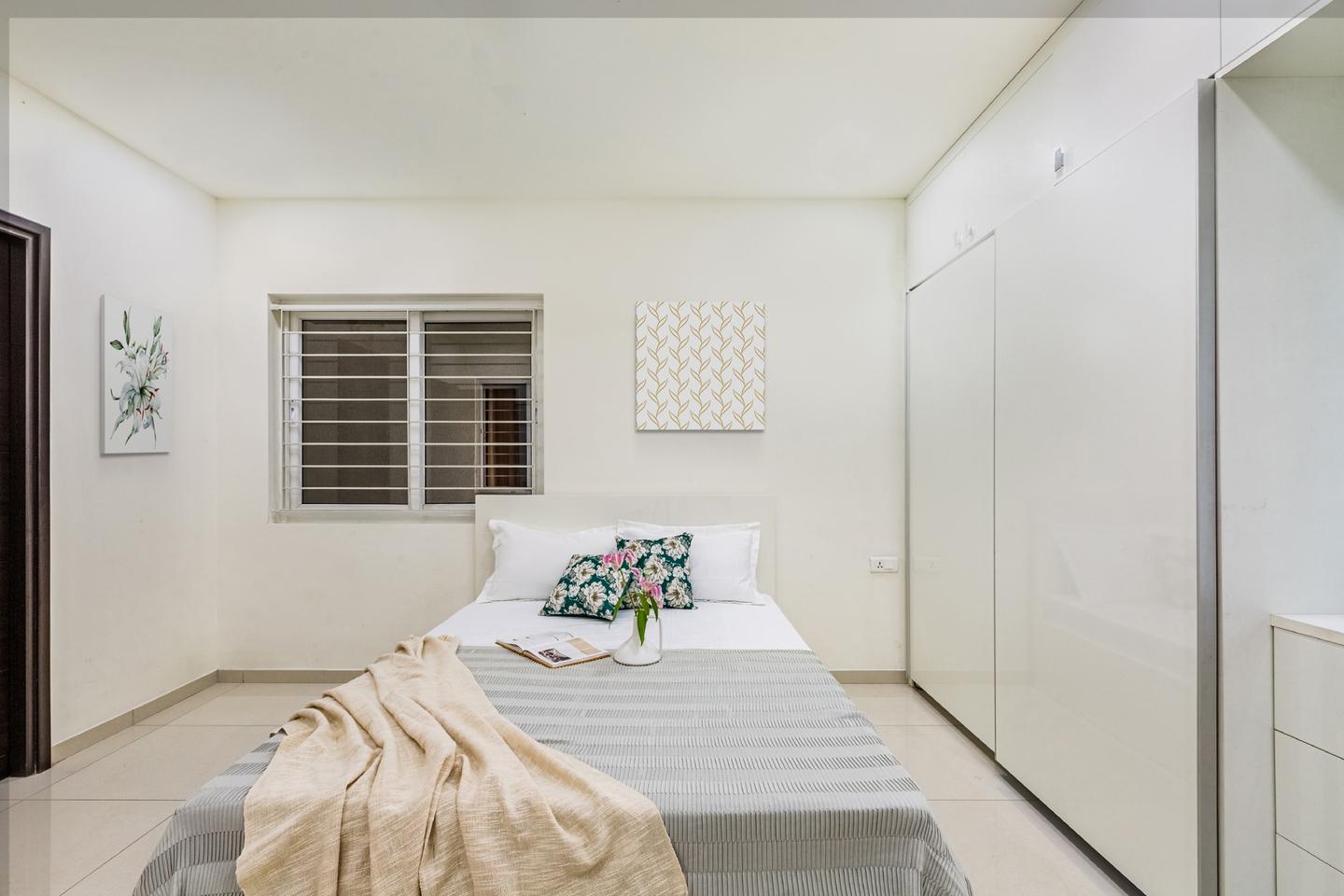 Creamy Plain Tiled Flooring Design | Livspace