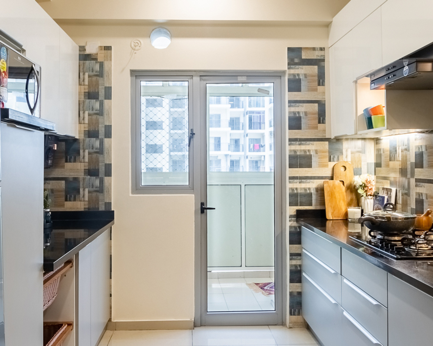 Grey And White Kitchen Window Design | Livspace