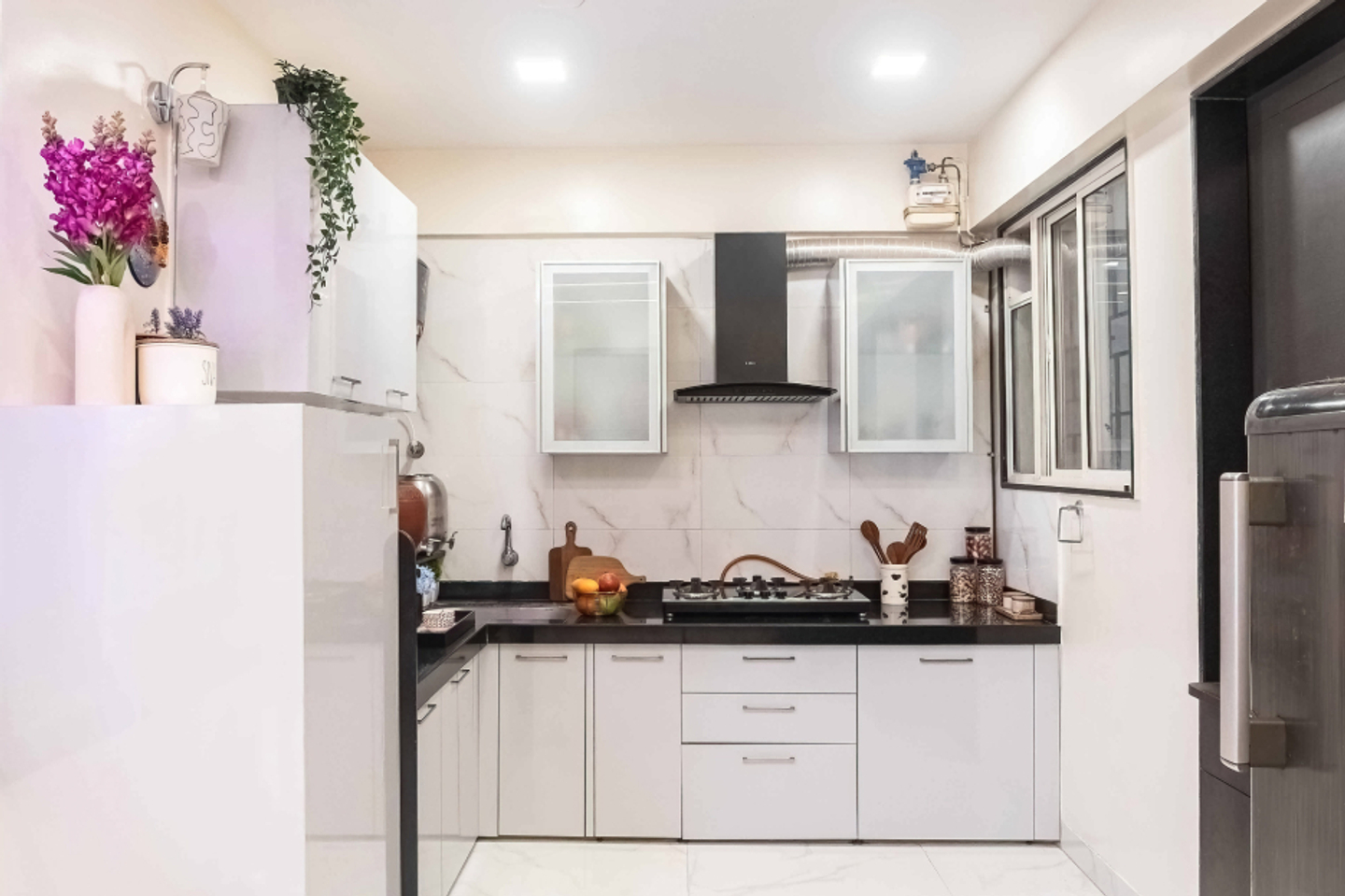 Kitchen Window Design With Black Granite Copping For The Sills | Livspace