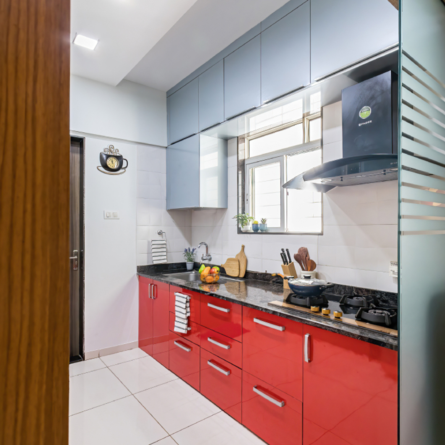 Kitchen Window Design With Grey Copping | Livspace