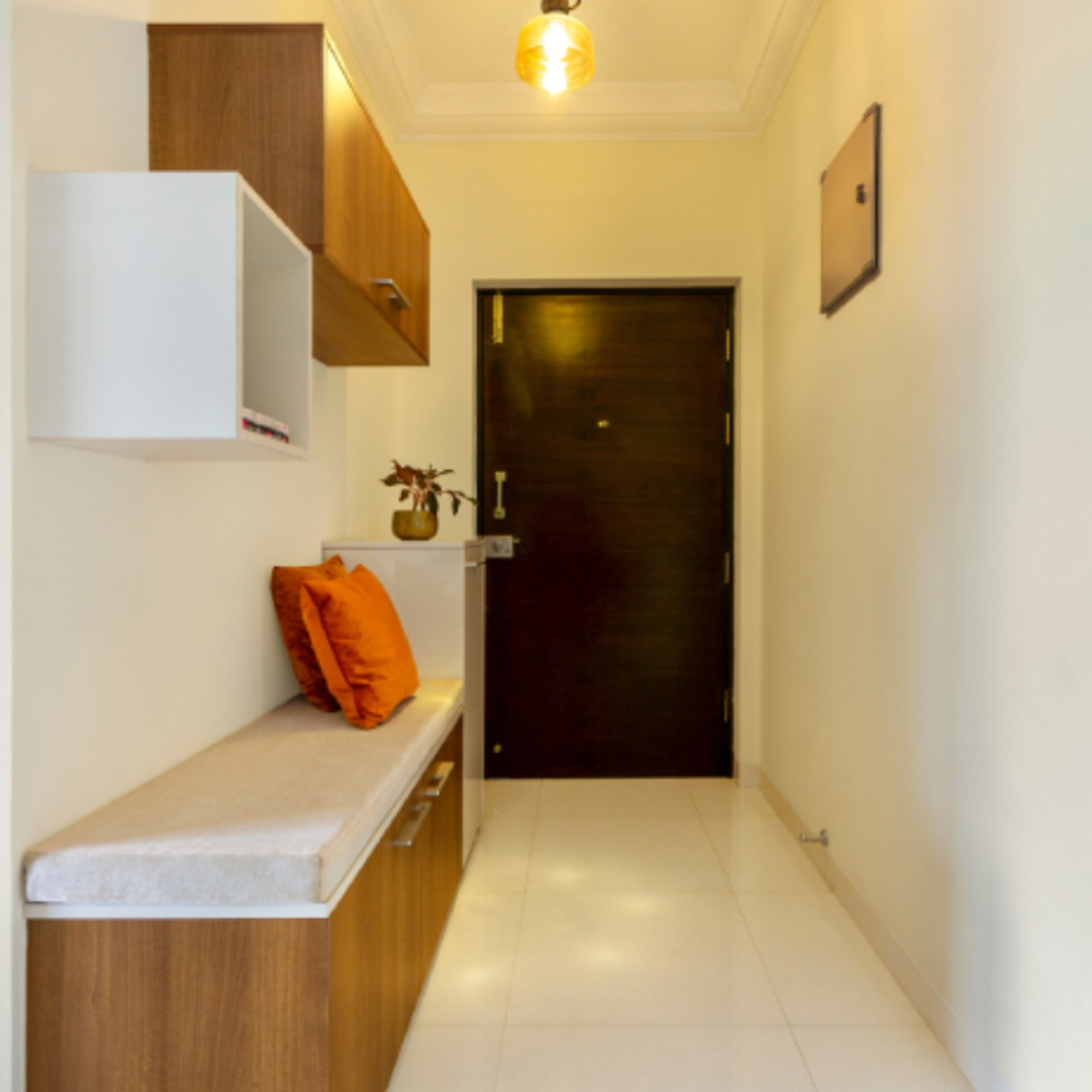 Floor-Mounted Brown Foyer Design | Livspace
