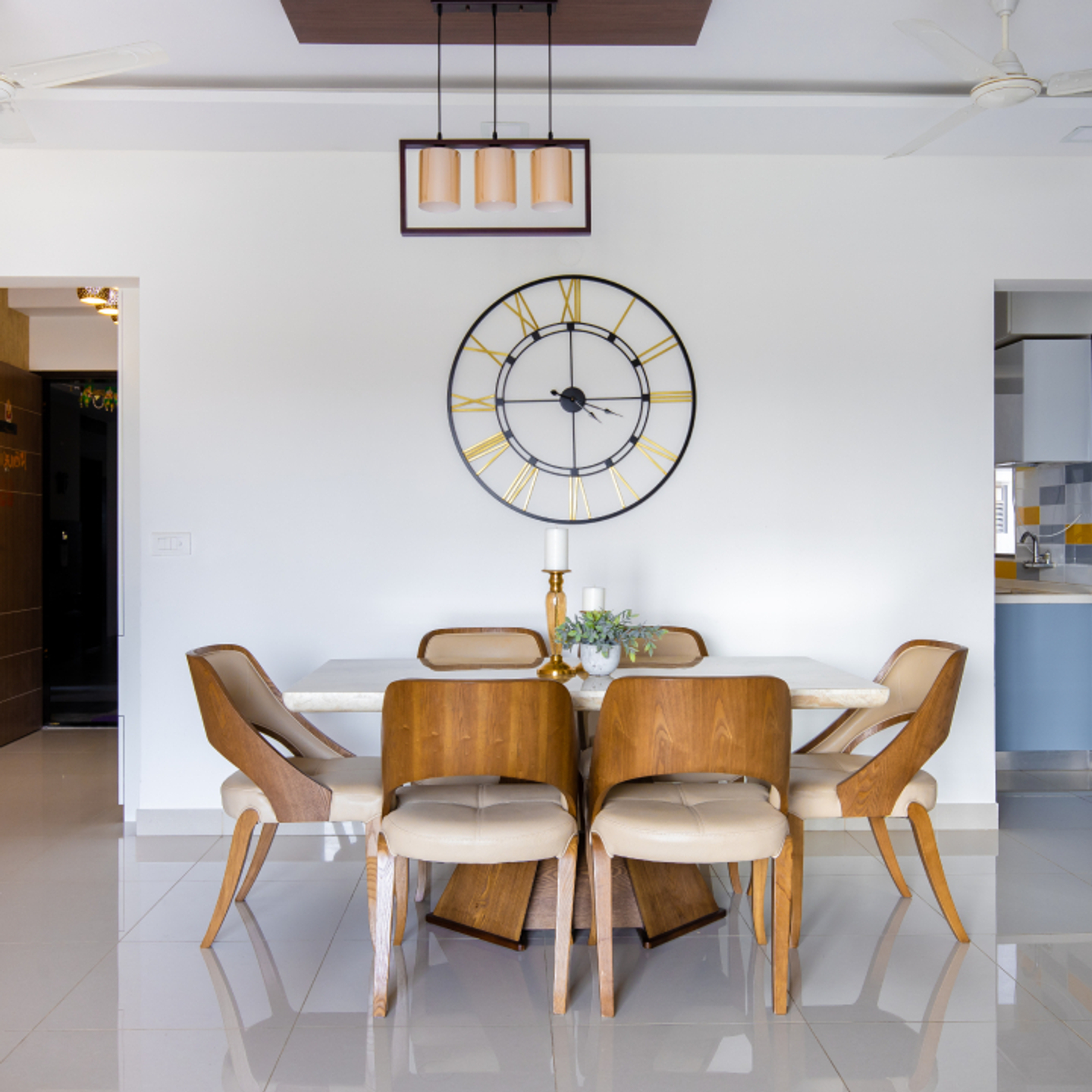 Low-Maintenance Dining Hall Design With Wooden Chairs | Livspace