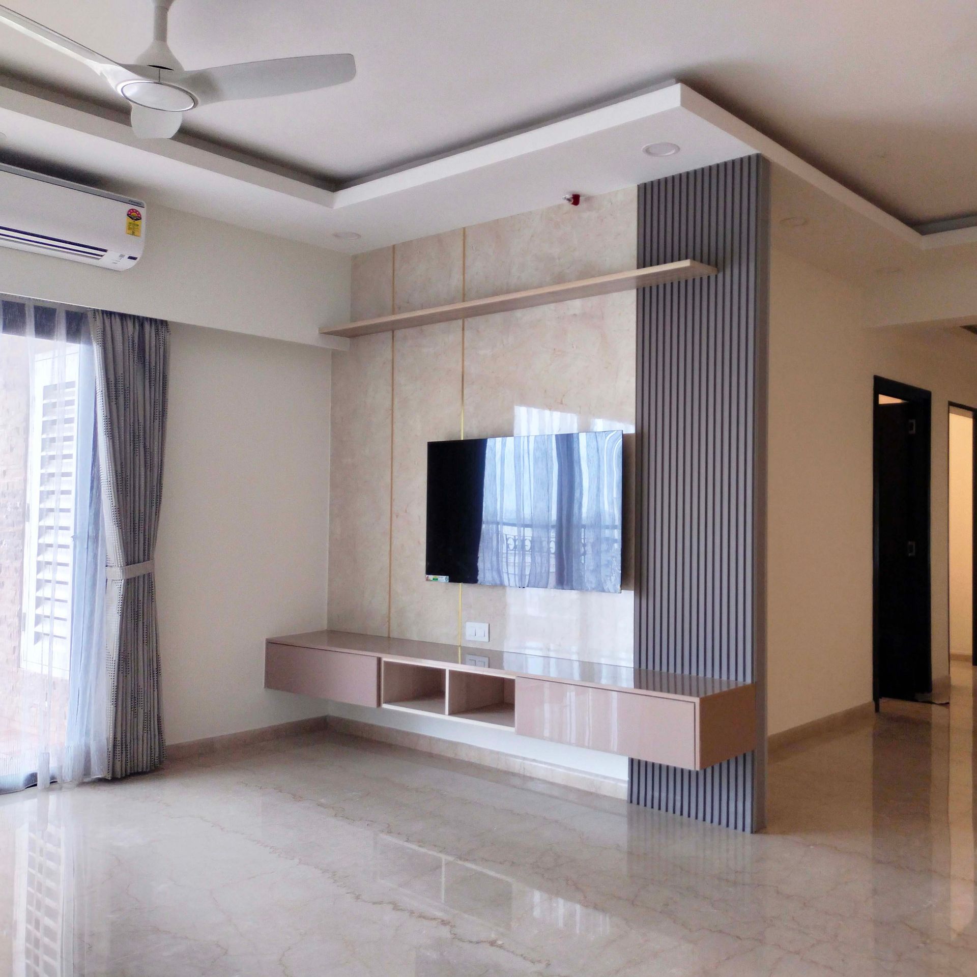 TV Unit Design with Contemporary Marble Texture Backpanel and Light ...