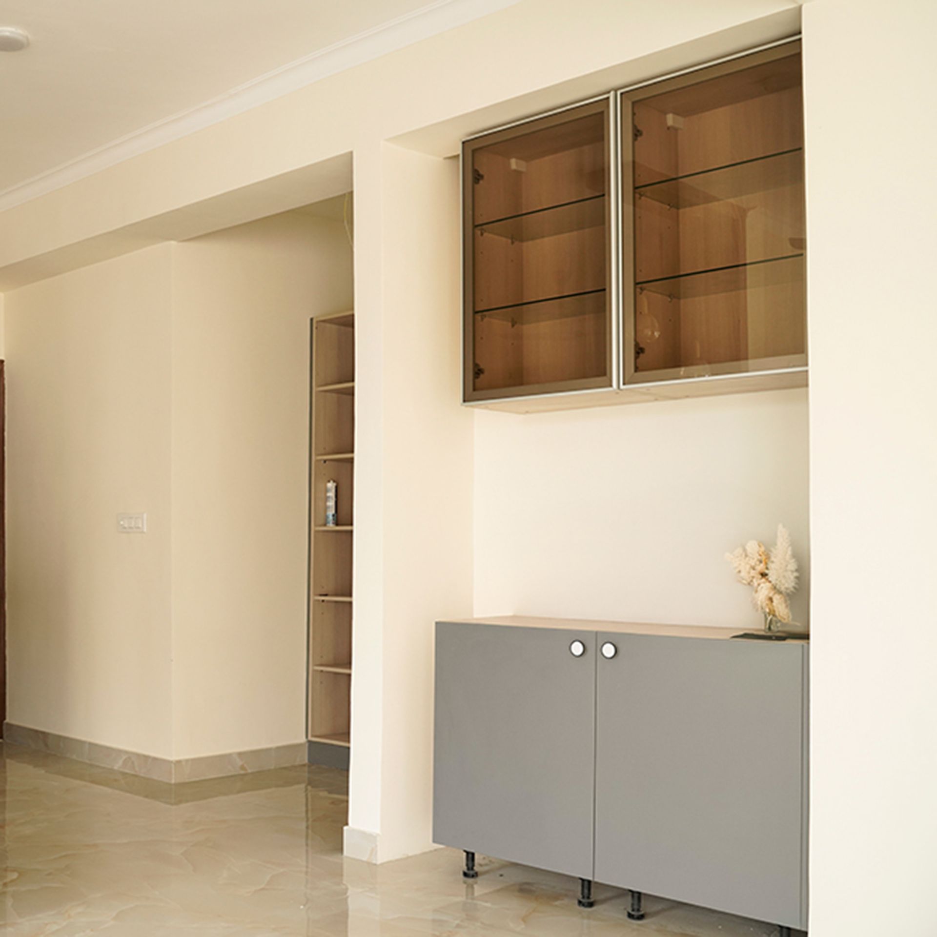 Grey Modern Dining Crockery Unit Design with Cabinet Storage | Livspace