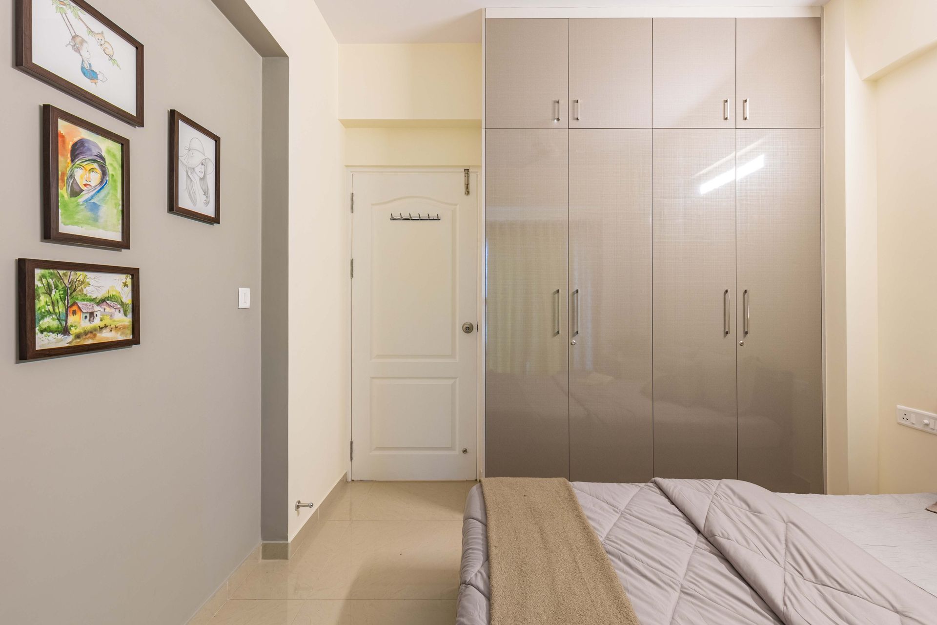 2-BHK Contemporary Bangalore Flat With Glossy Blue And White L-Shaped Kitchen Design | Livspace