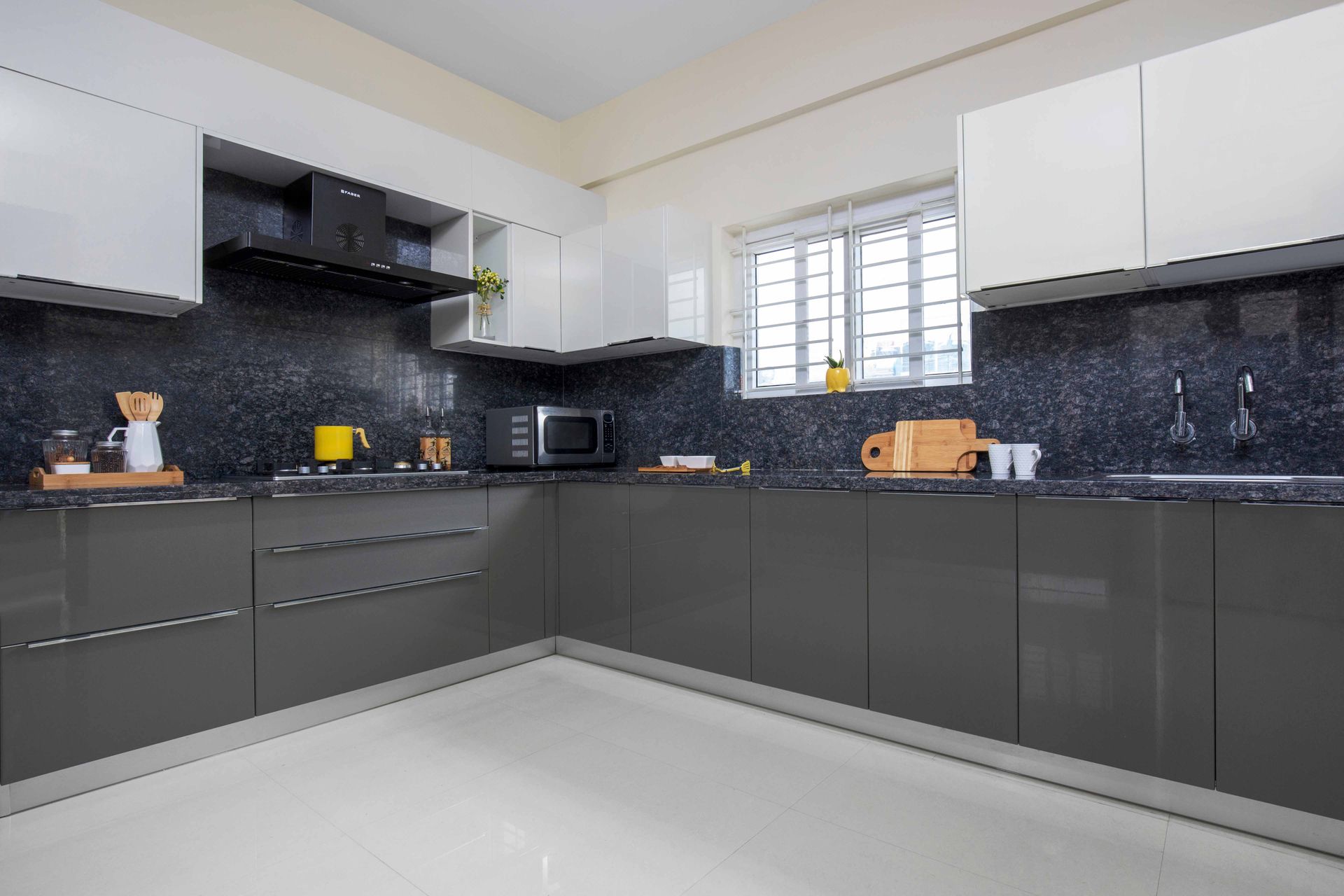 2-BHK Flat In Bangalore With Grey And White L-Shaped Kitchen Design | Livspace