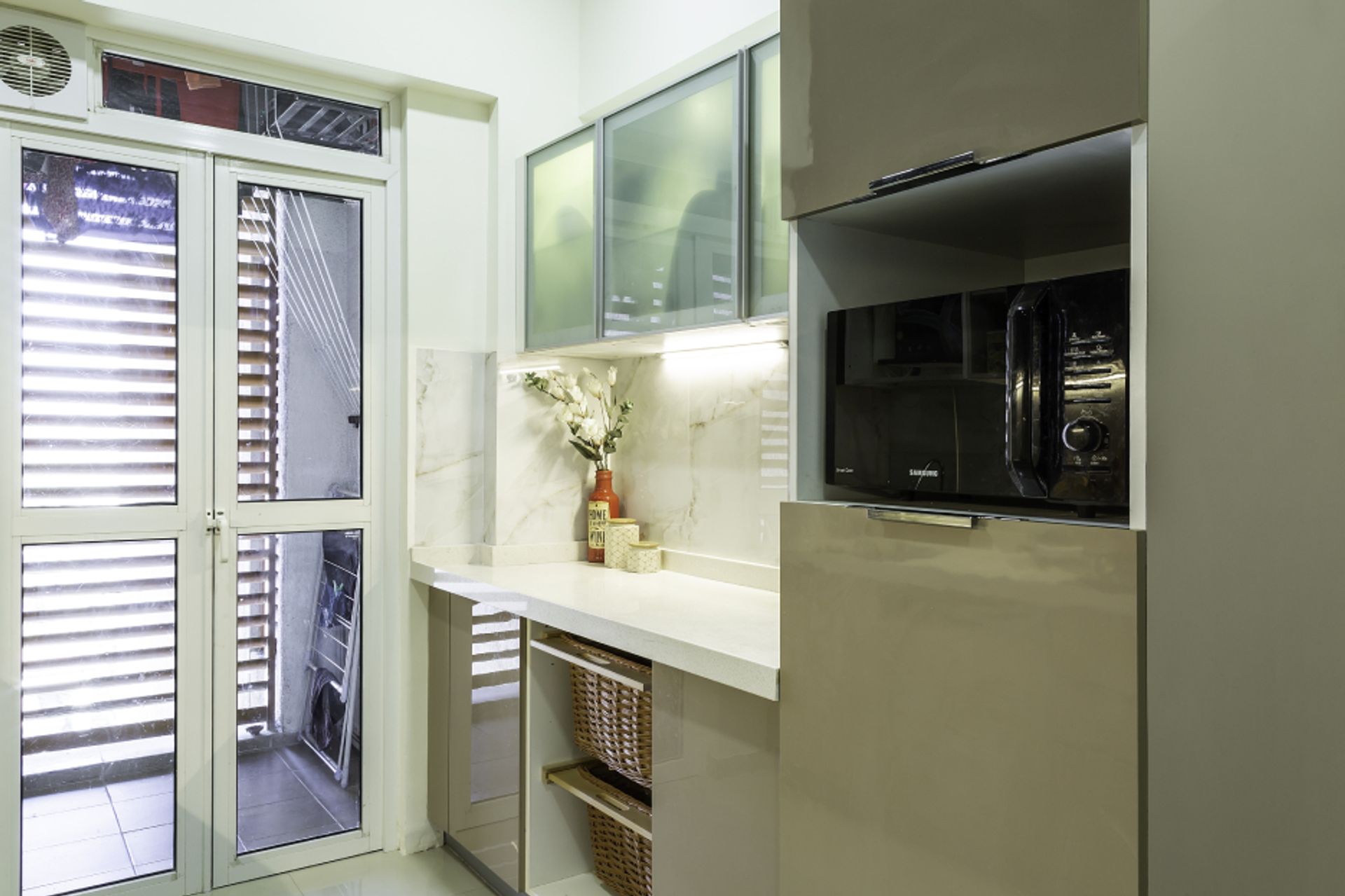 Compact Parallel Kitchen Design With Marble Tiles | Livspace