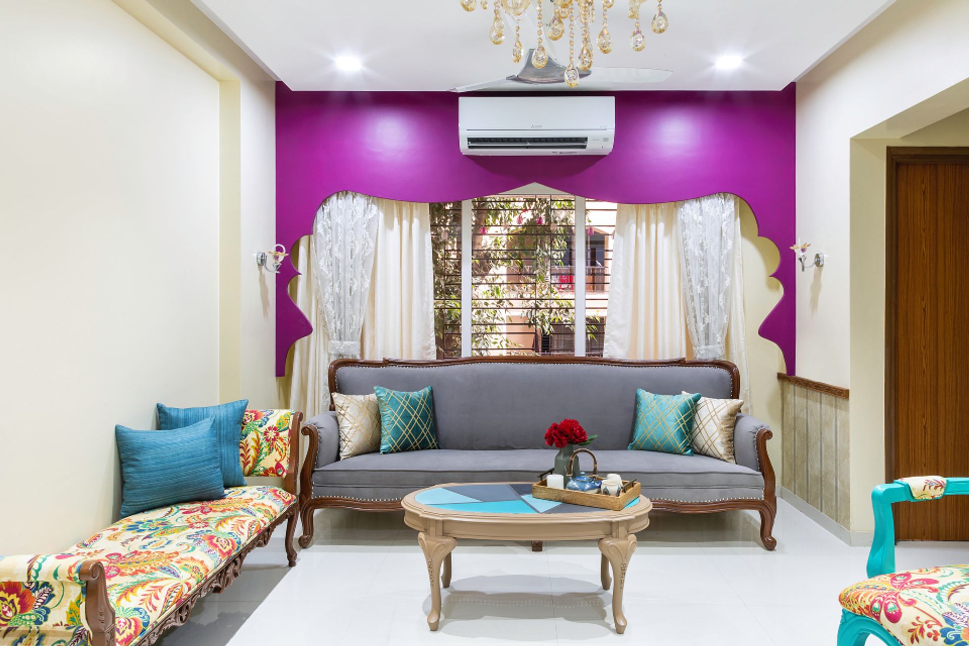 Compact Drawing Room Design With Colourful Seating | Livspace